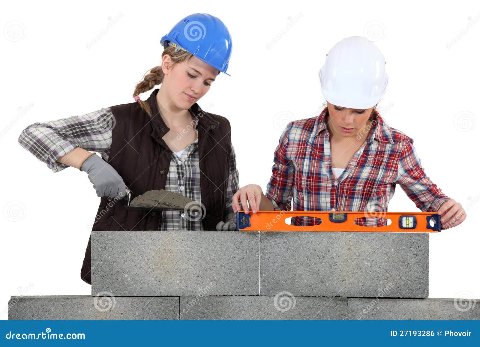 Two female bricklayers stock photo. Image of craftwoman - 27193286