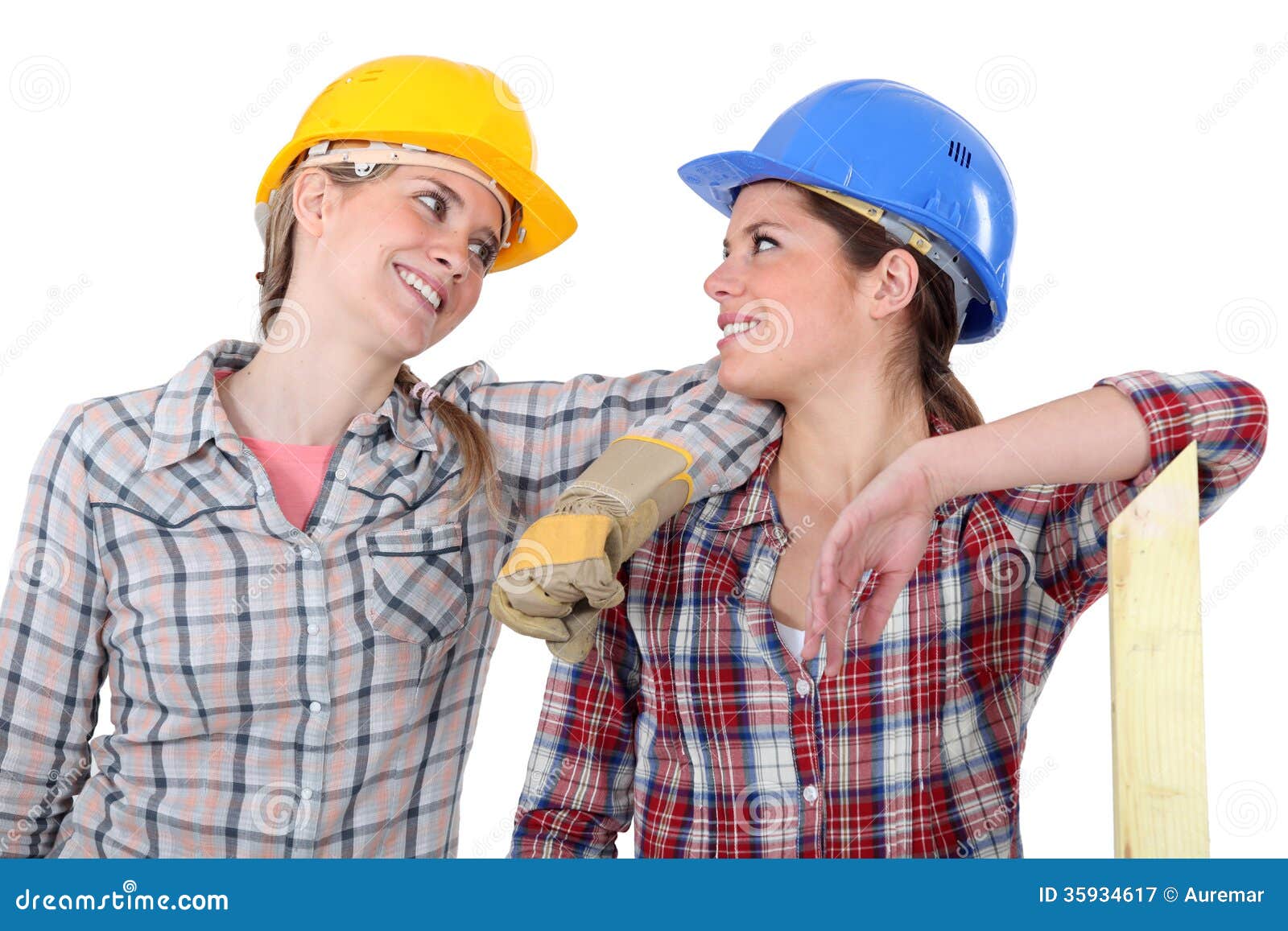 Two Female Carpenters Chatting Stock Image - Image of chums, coverall ...
