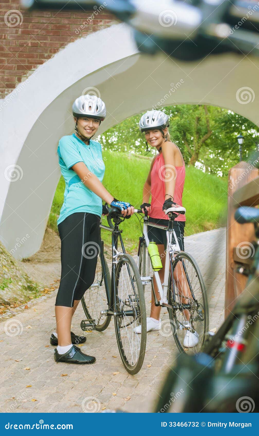 Two Female Caucasian Cyclists Standing Outdoors Smiling Stock Photo ...