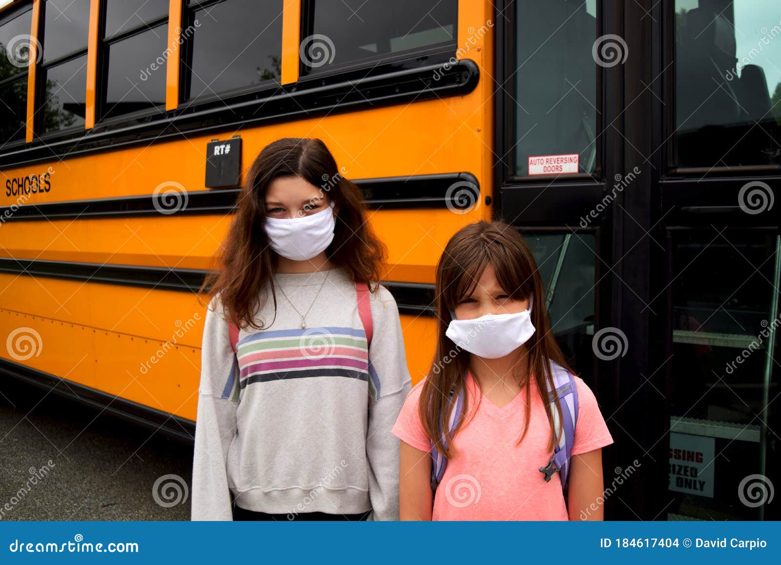 Coronavirus School:Two Female Children Wearing Facemasks in Front of a ...