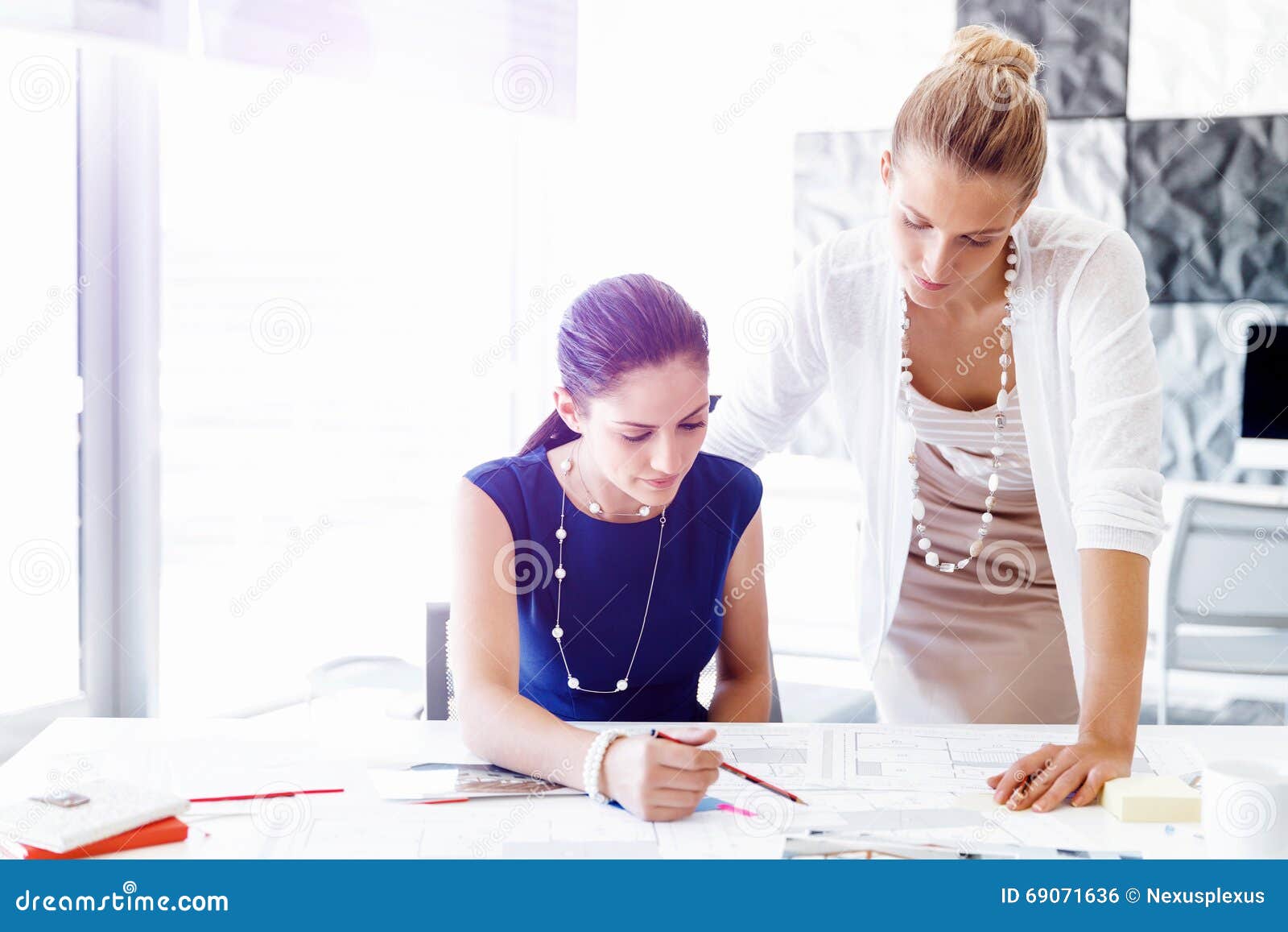 Two Female Colleagues in Office Stock Photo - Image of office ...