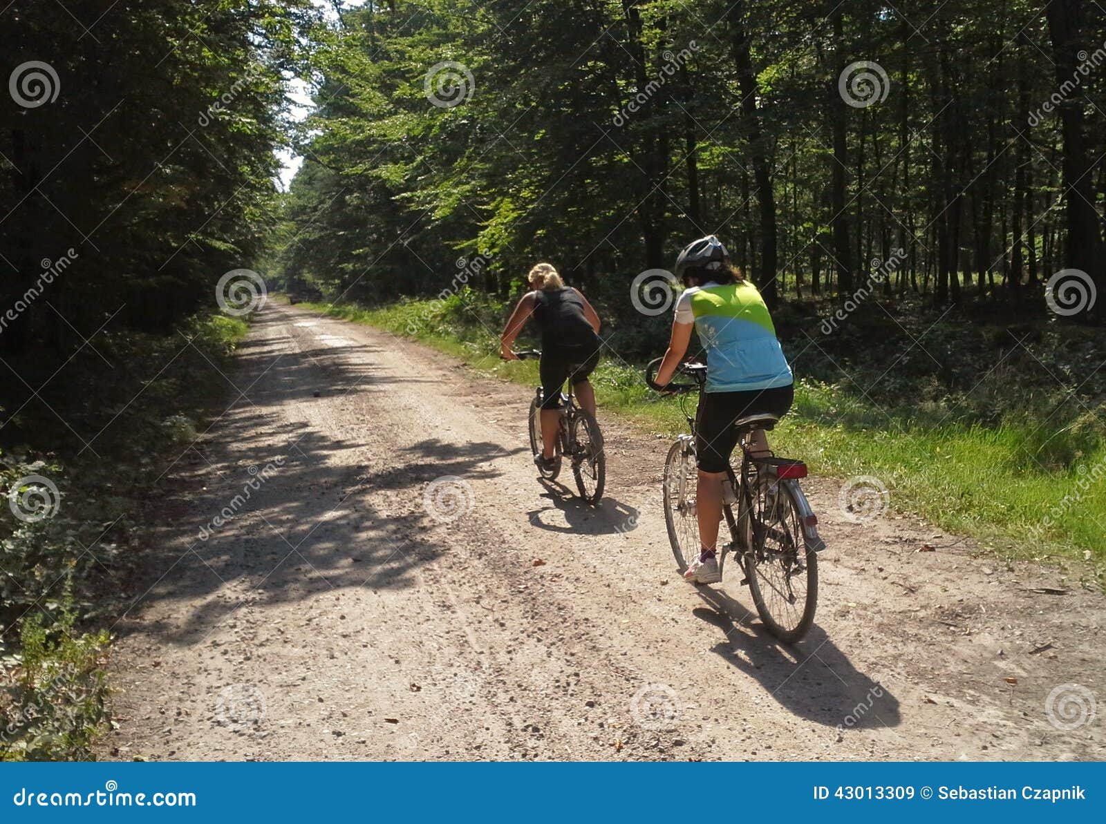 Two female cyclists stock image. Image of active, cyclist - 43013309