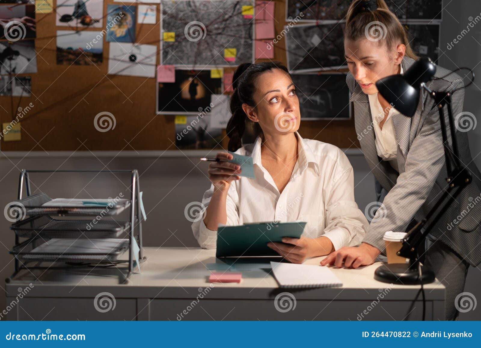 Two Female Detective Working at Desk in Her Office Stock Photo - Image ...