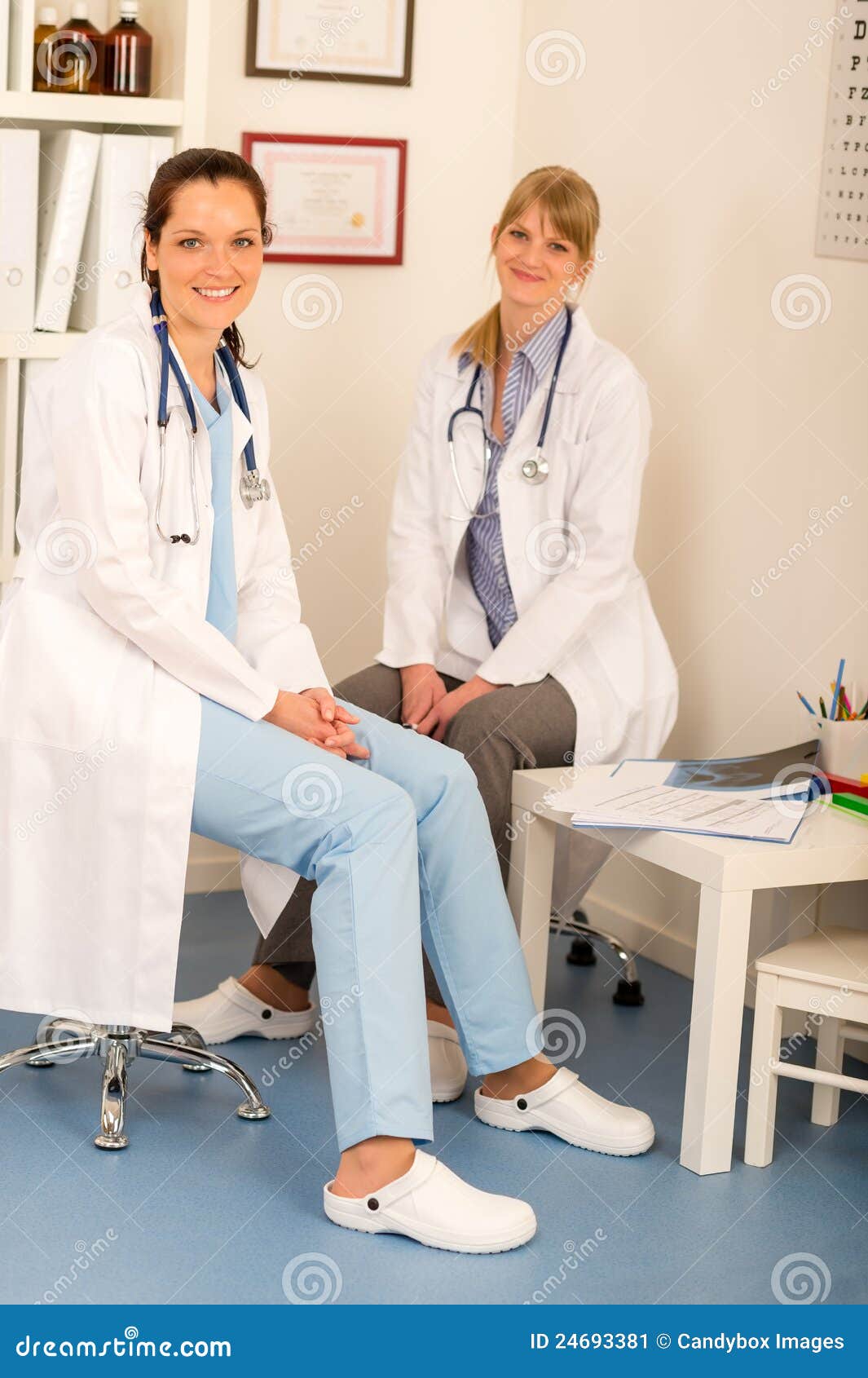 Two Female Doctor Sitting Surgery Office Stock Image - Image: 24693381