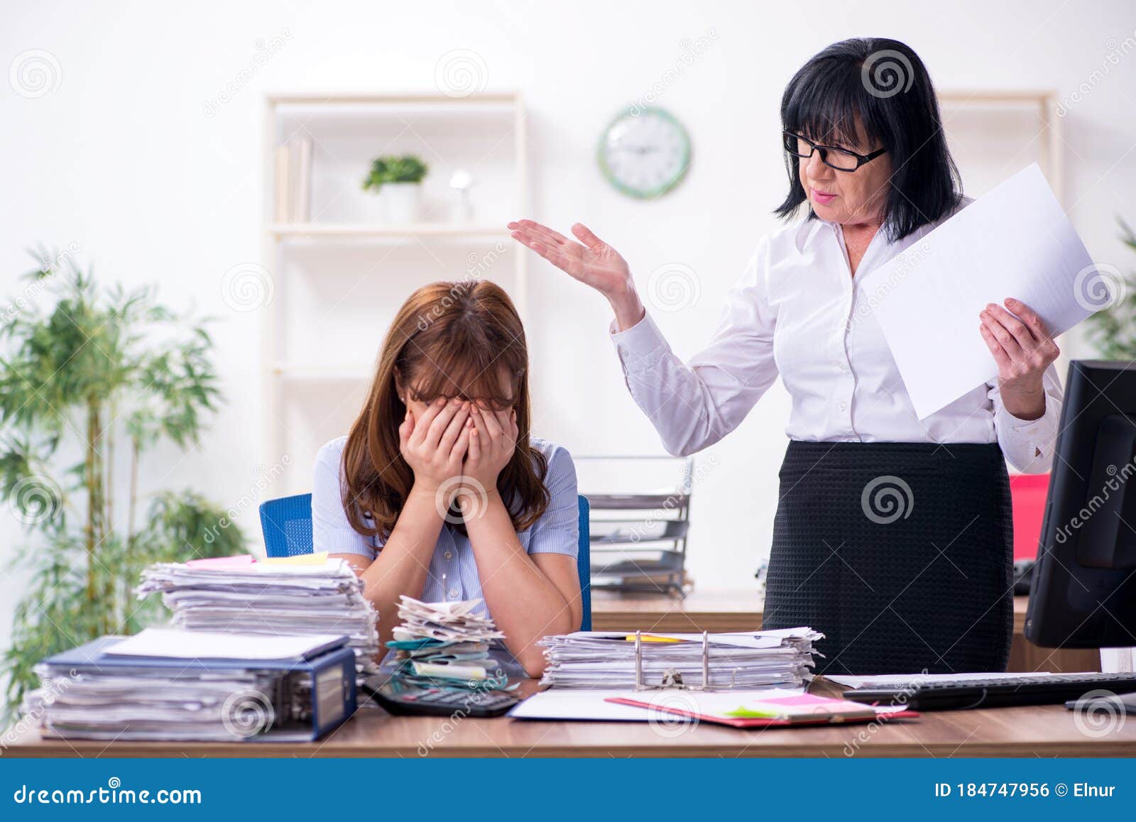 Two Female Employees and Excessive Work in the Office Stock Photo ...