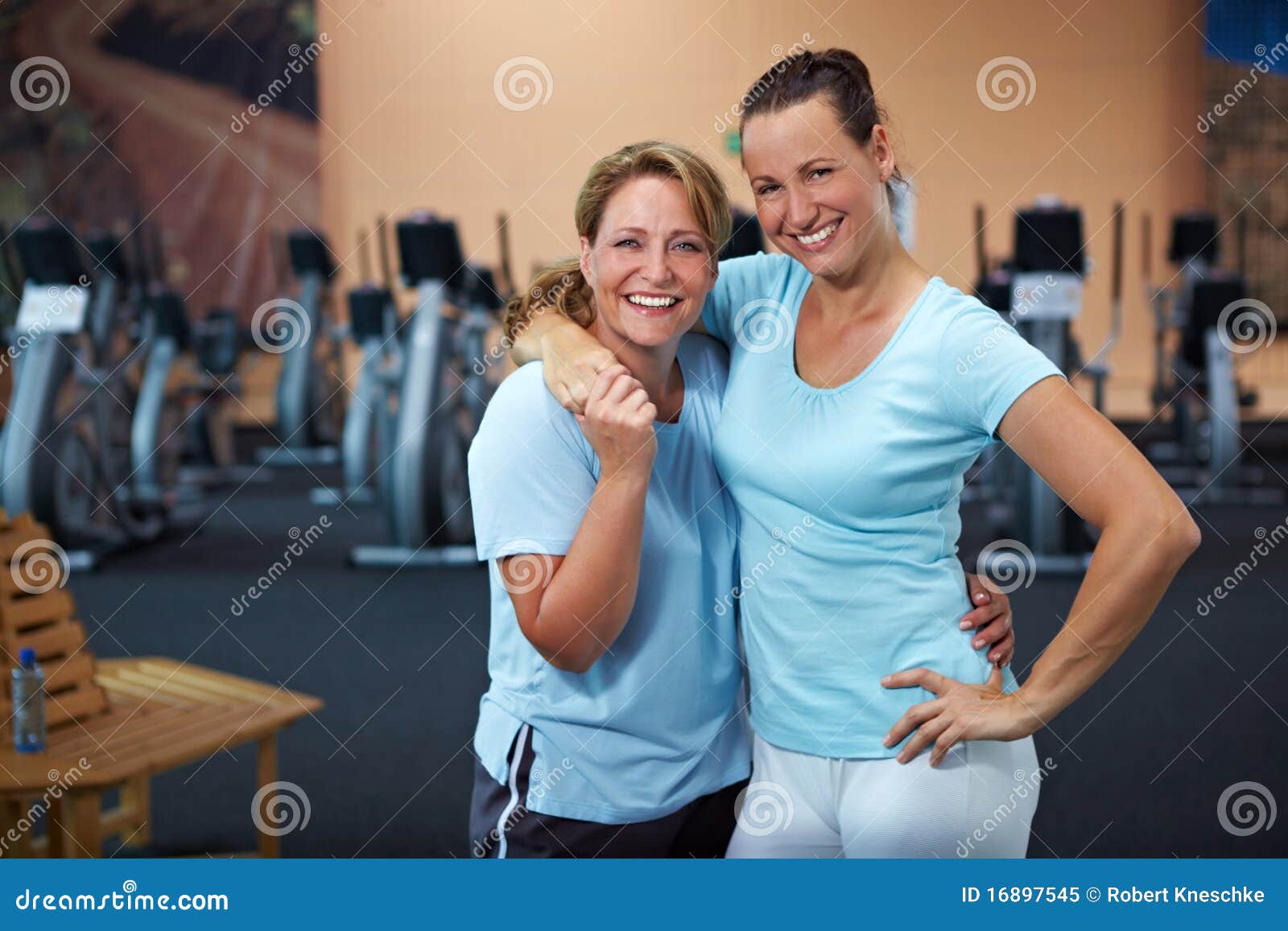 Two Female Employees in Gym Stock Image - Image of embrace, caucasian ...