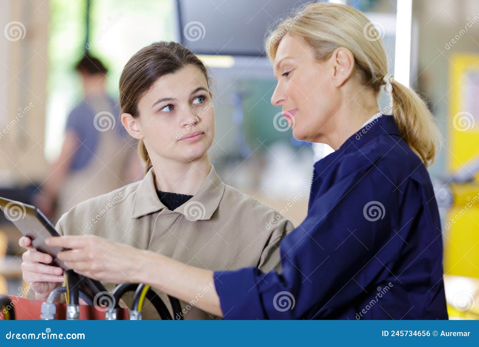 Two Female Engineers Working Together Stock Photo - Image of technology ...