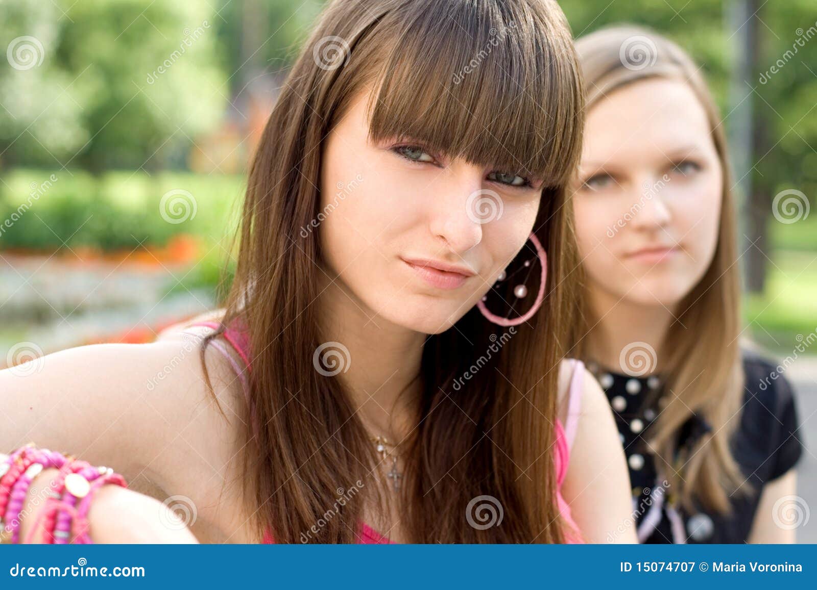 Two Female Friends on Bench Stock Image - Image of caucasians, modern ...