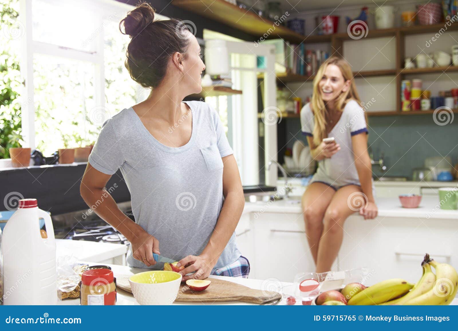 Two Female Friends Preparing Breakfast at Home Together Stock Image ...