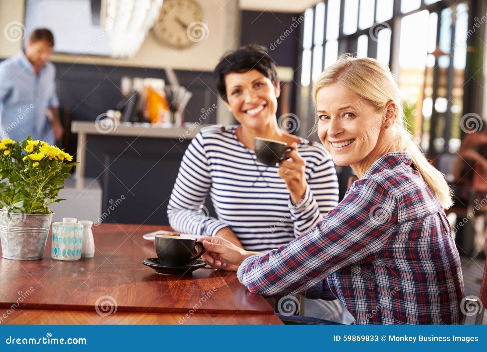 Two Female Friends Talking at a Coffee Shop Stock Image - Image of ...