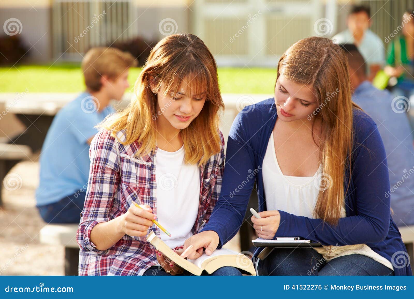 Two Female High School Students Working on Campus Stock Photo - Image ...