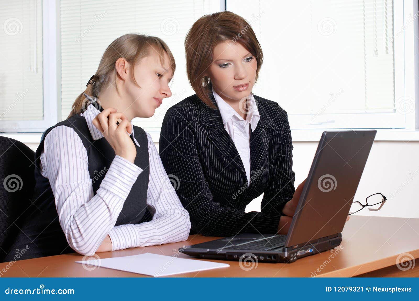 Two female in office stock image. Image of occupation - 12079321