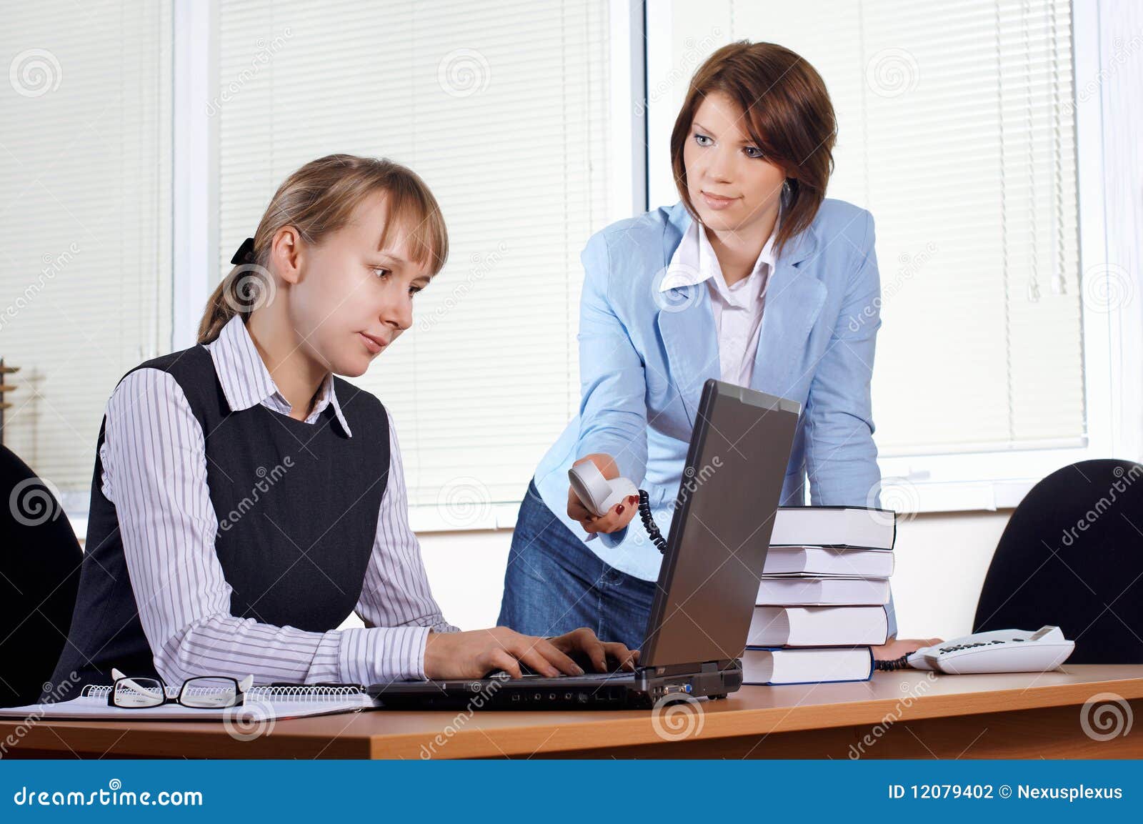 Two female in office stock photo. Image of group, business - 12079402