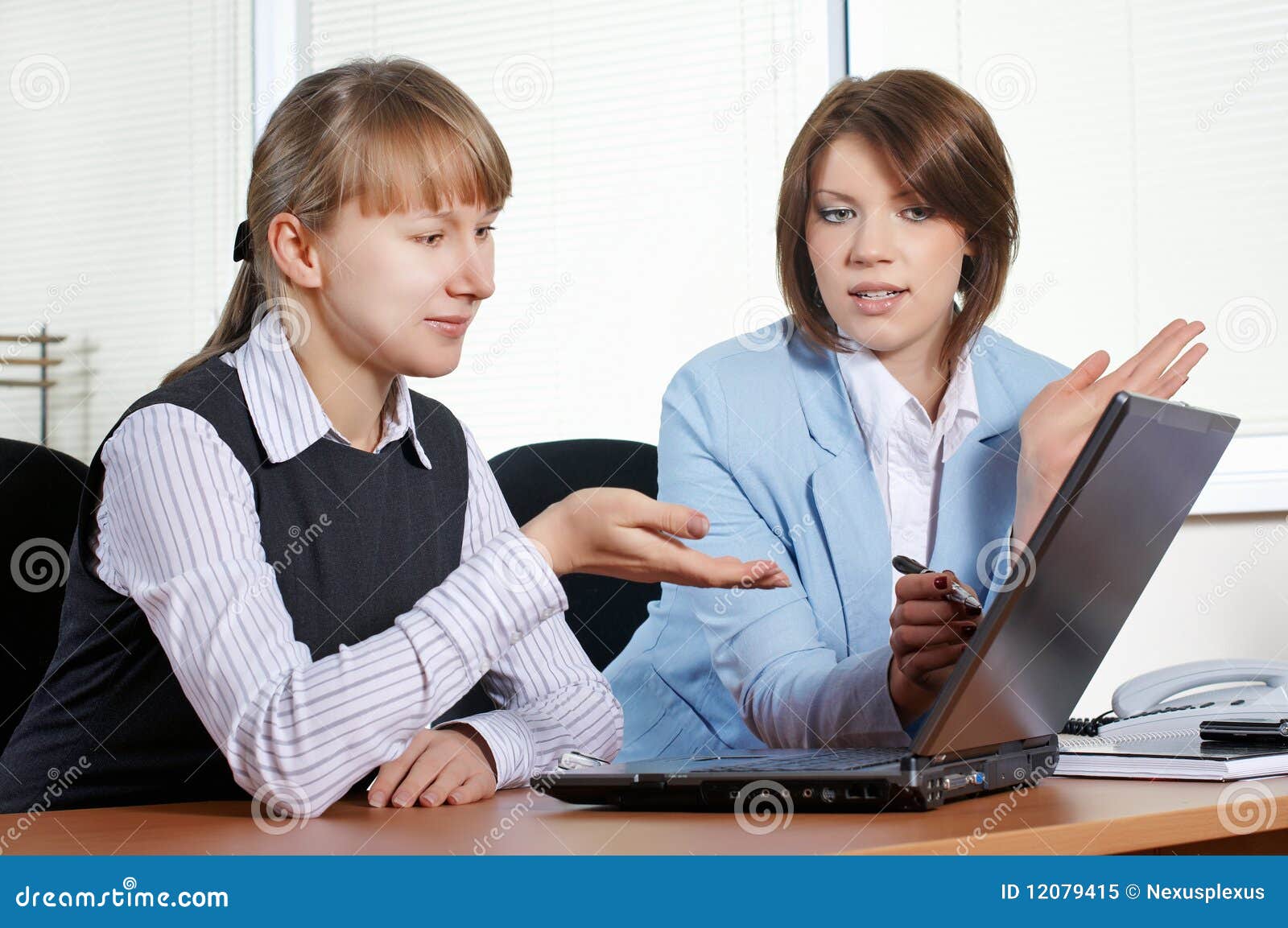 Two female in office stock image. Image of cheerful, looking - 12079415