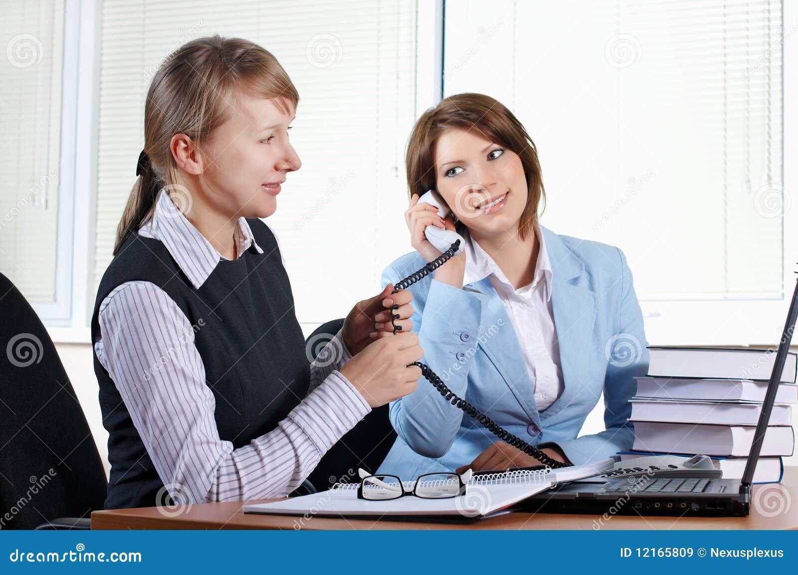 Two female in office stock image. Image of businesswoman - 12165809