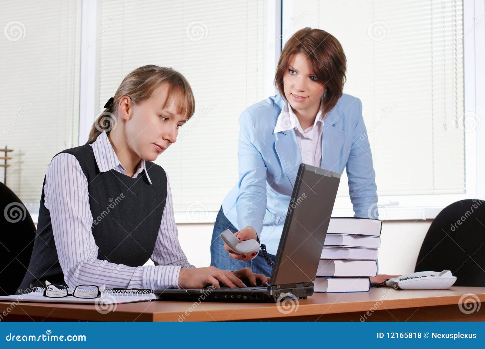 Two female in office stock photo. Image of consultant - 12165818