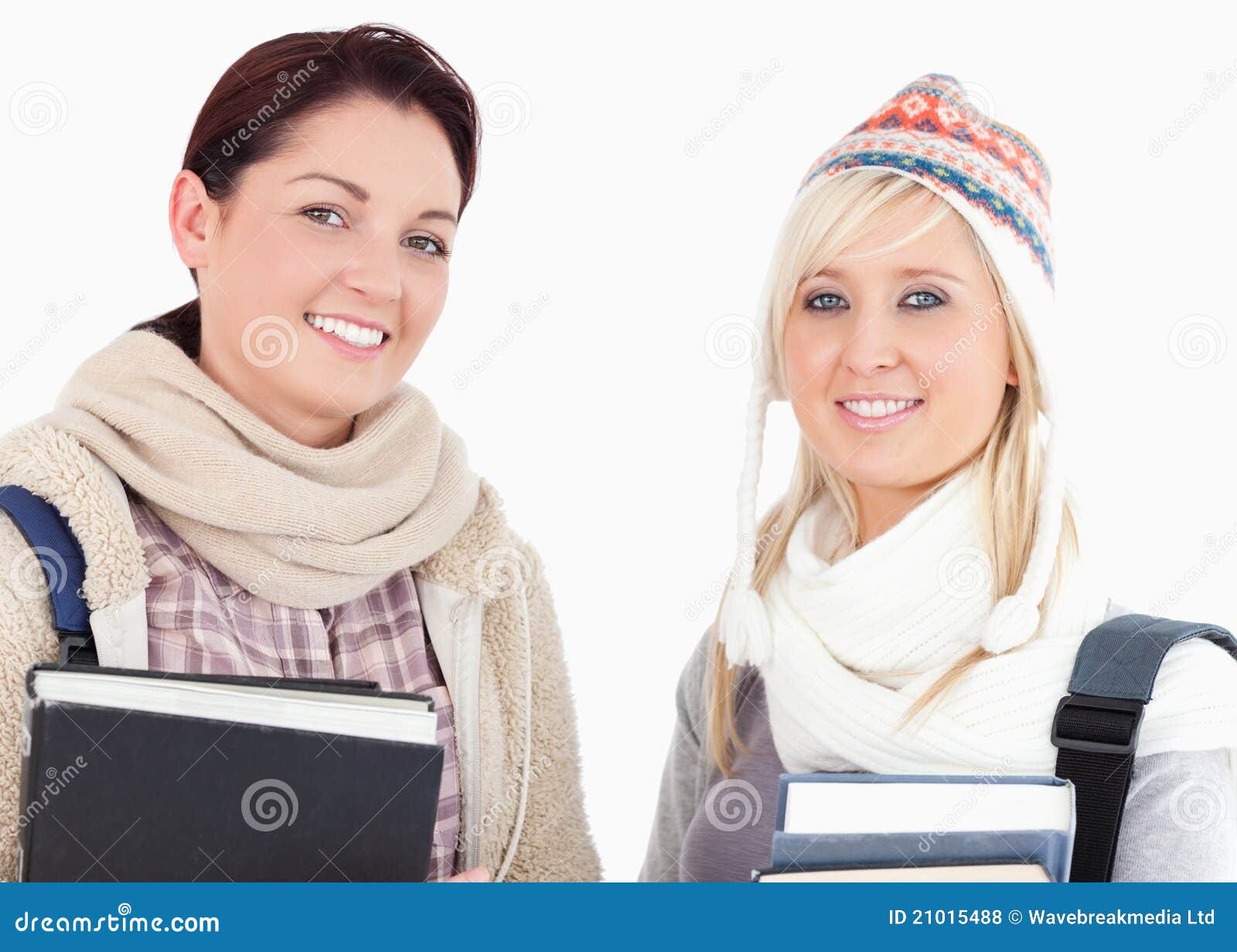 Two Female Students with Books Looking Stock Photo - Image of ...