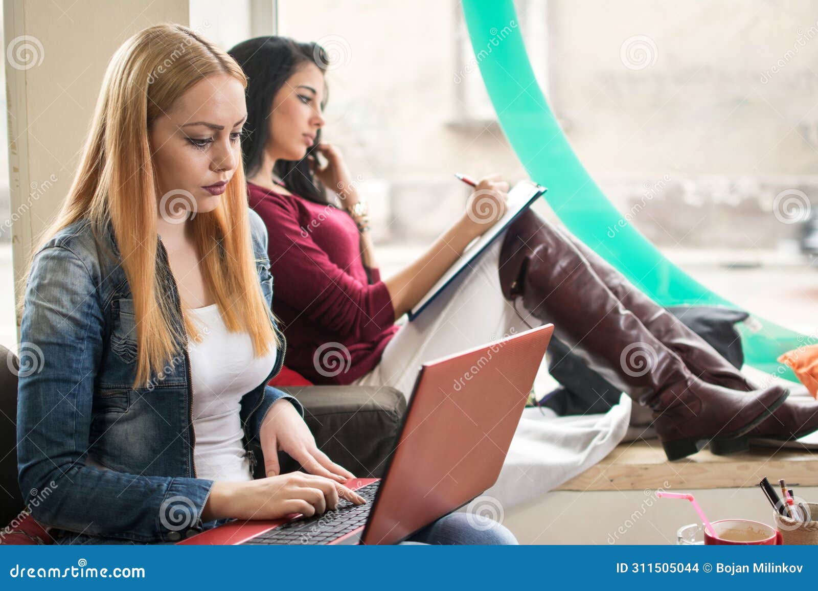 Two Female Students Learning at University Stock Photo - Image of ...