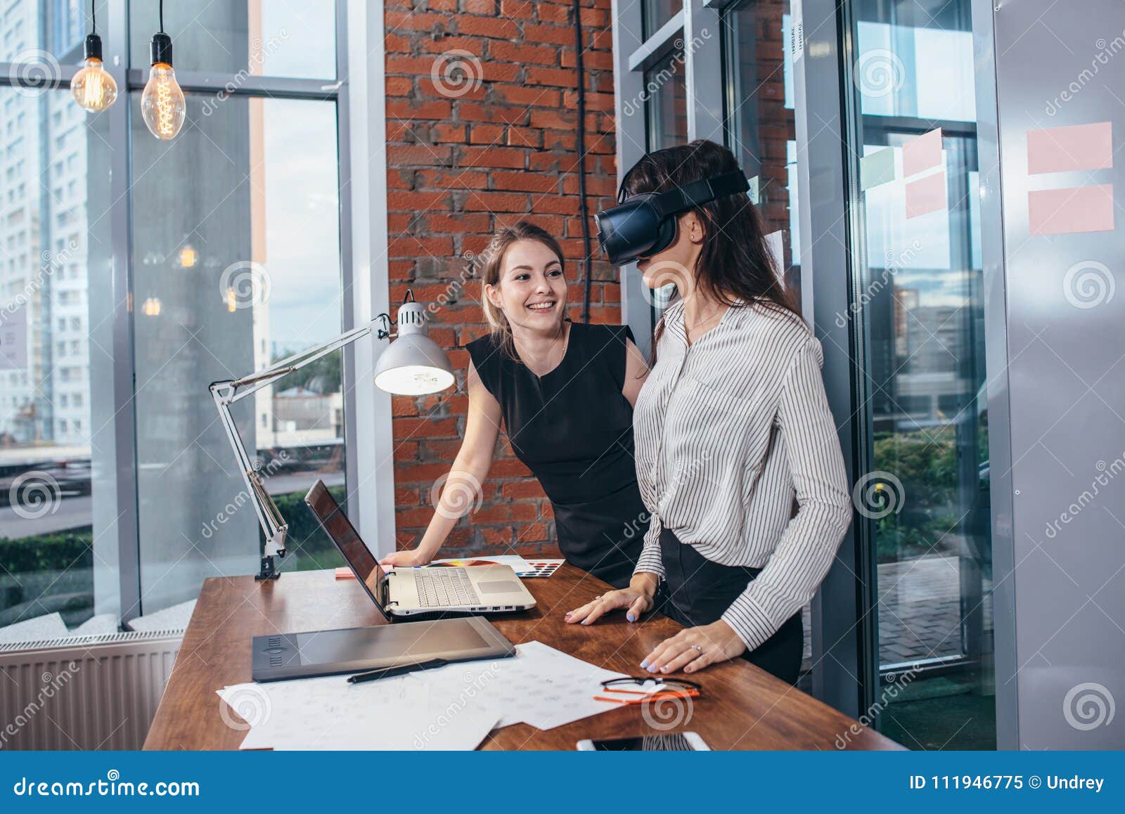 Two Female Students Playing a 3d Game in VR Glasses Having a Break ...