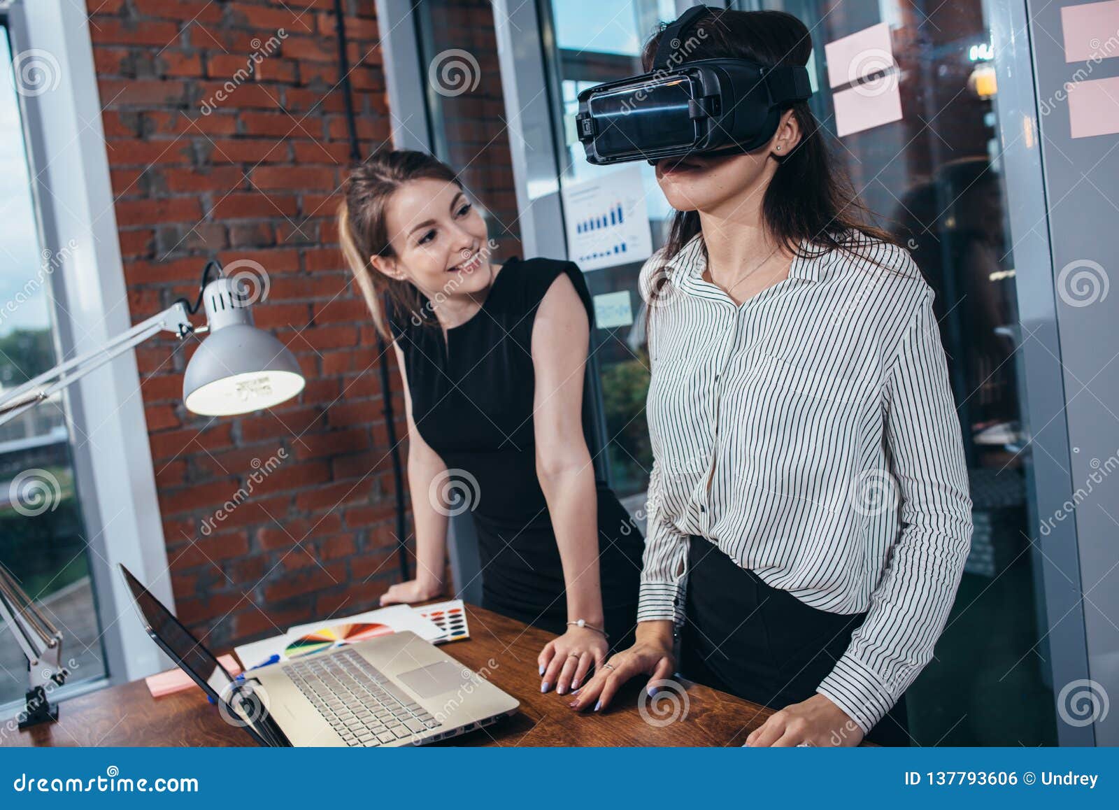 Two Female Students Playing a 3d Game in VR Glasses Having a Break ...