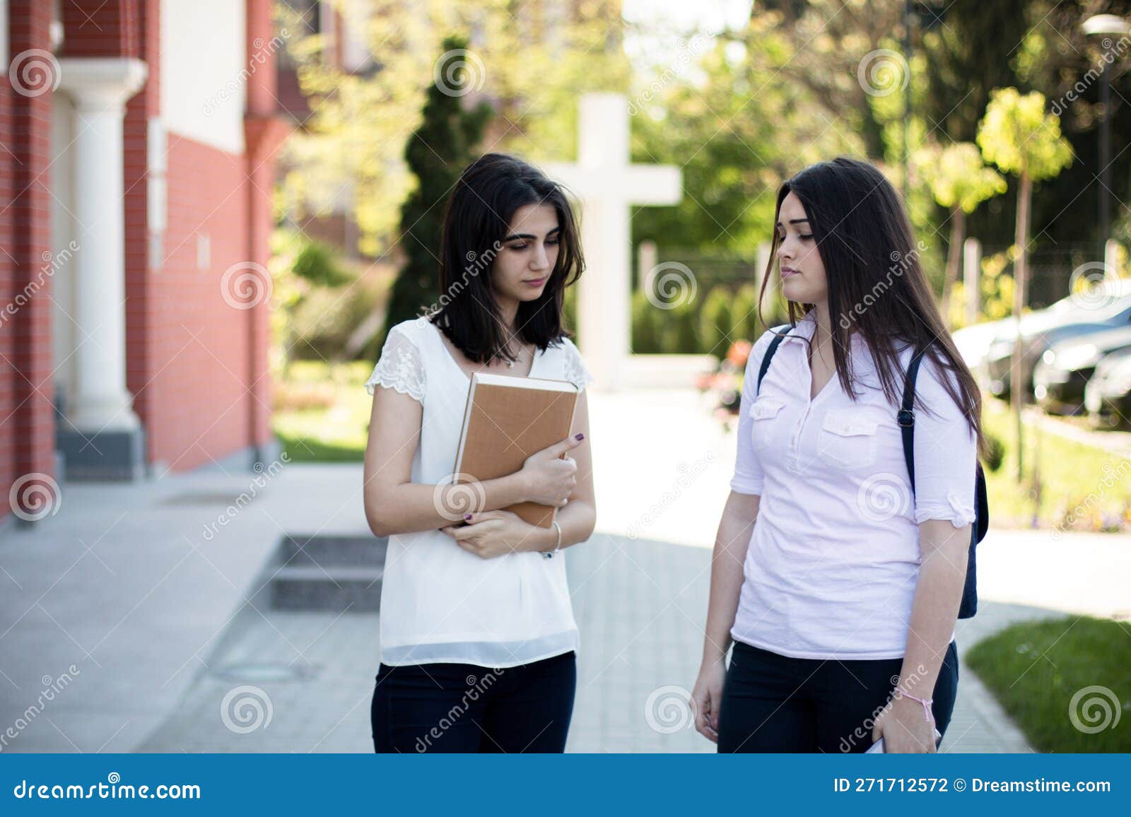 Two Female Students Talking about Their Struggles on the Campus Stock ...