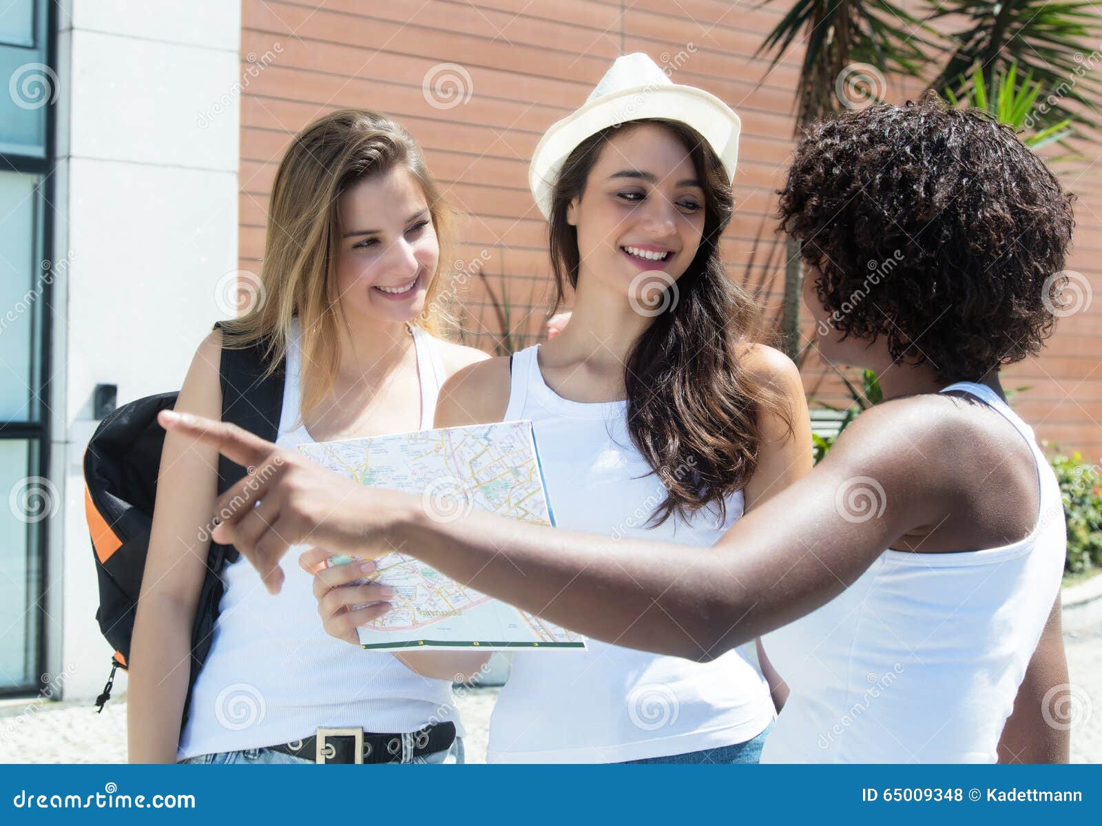 Two Female Tourists Asking for the Way Stock Photo - Image of hispanic ...