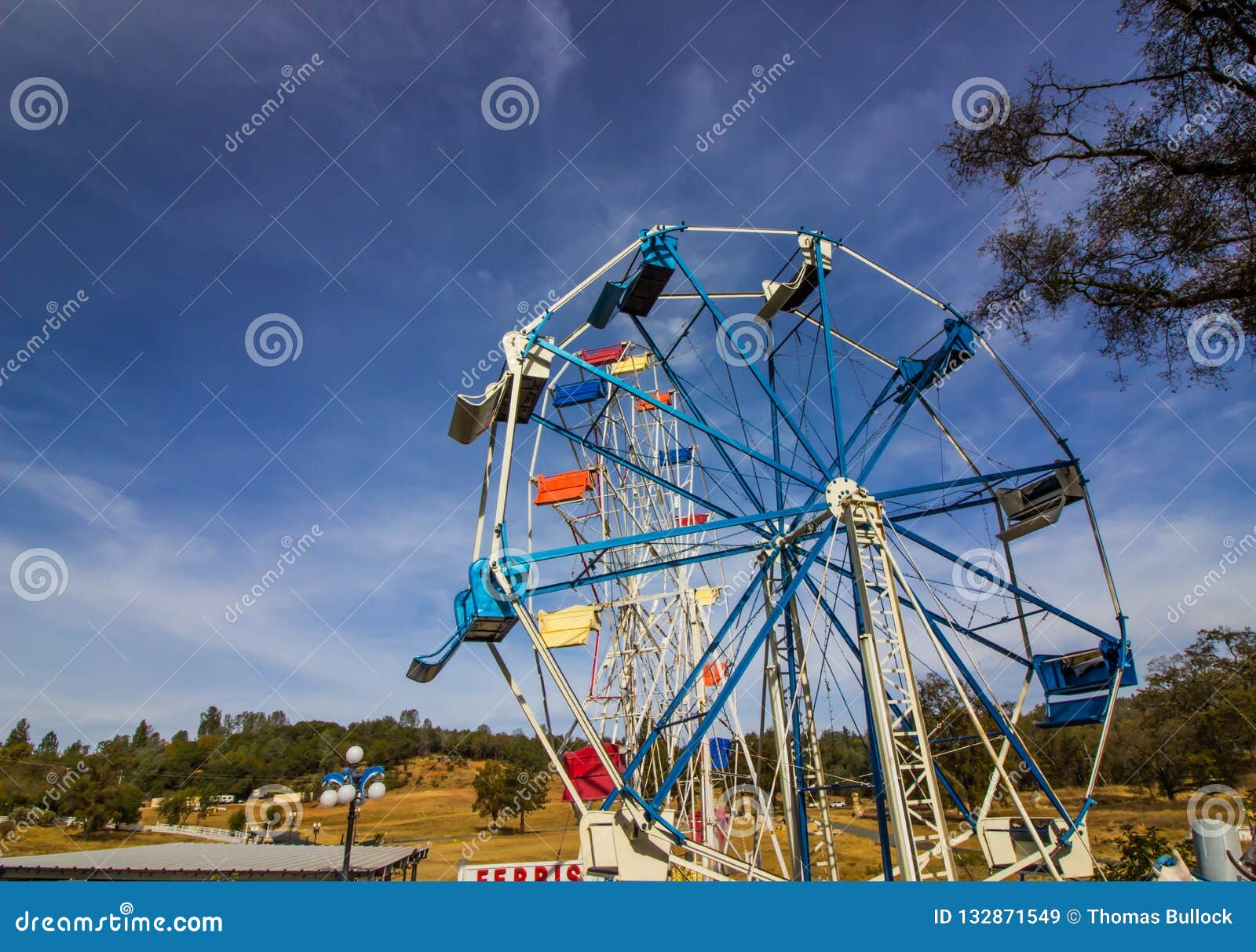 Two Ferris Wheels in Storage Stock Image - Image of corrugated, hills ...