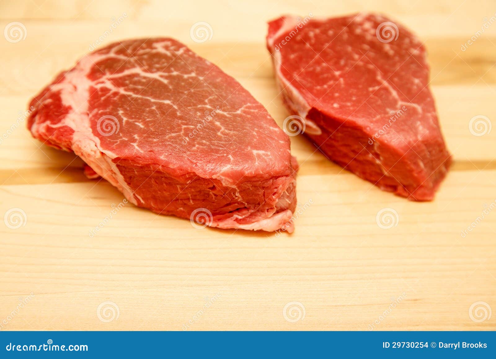 Two Filet Mignon Steaks on Wood Cutting Board Stock Photo - Image of ...