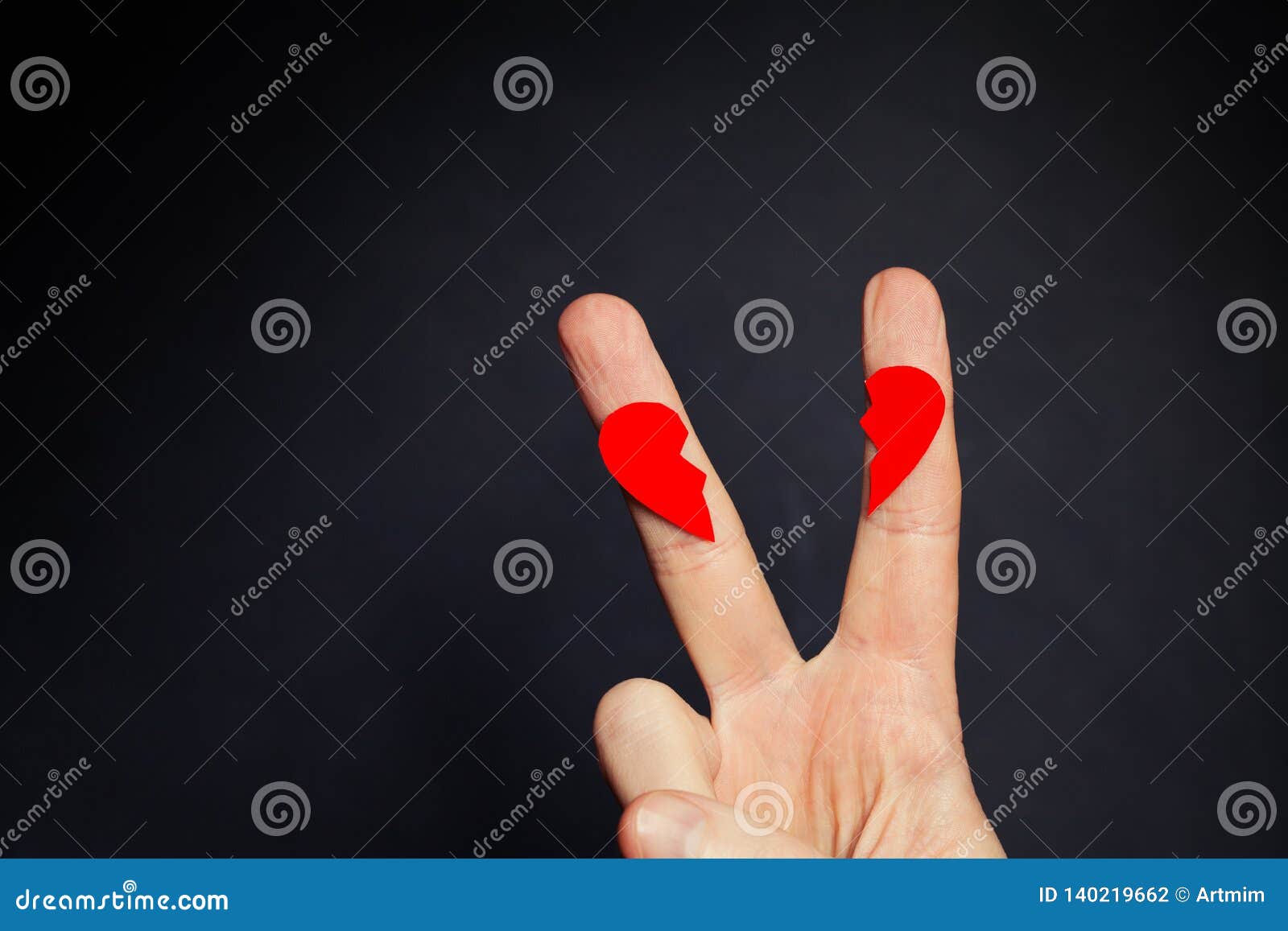 Two Fingers People with Broken Heart on Chalkboard Background with ...