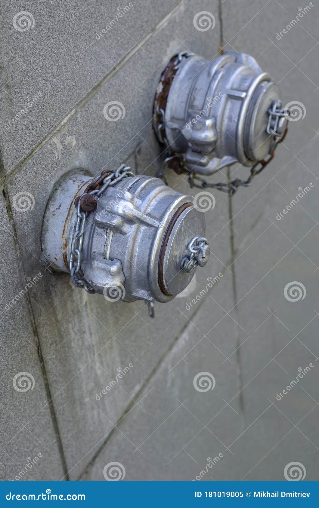 Two Fire Hydrants Outside the Building Close-up Stock Image - Image of ...