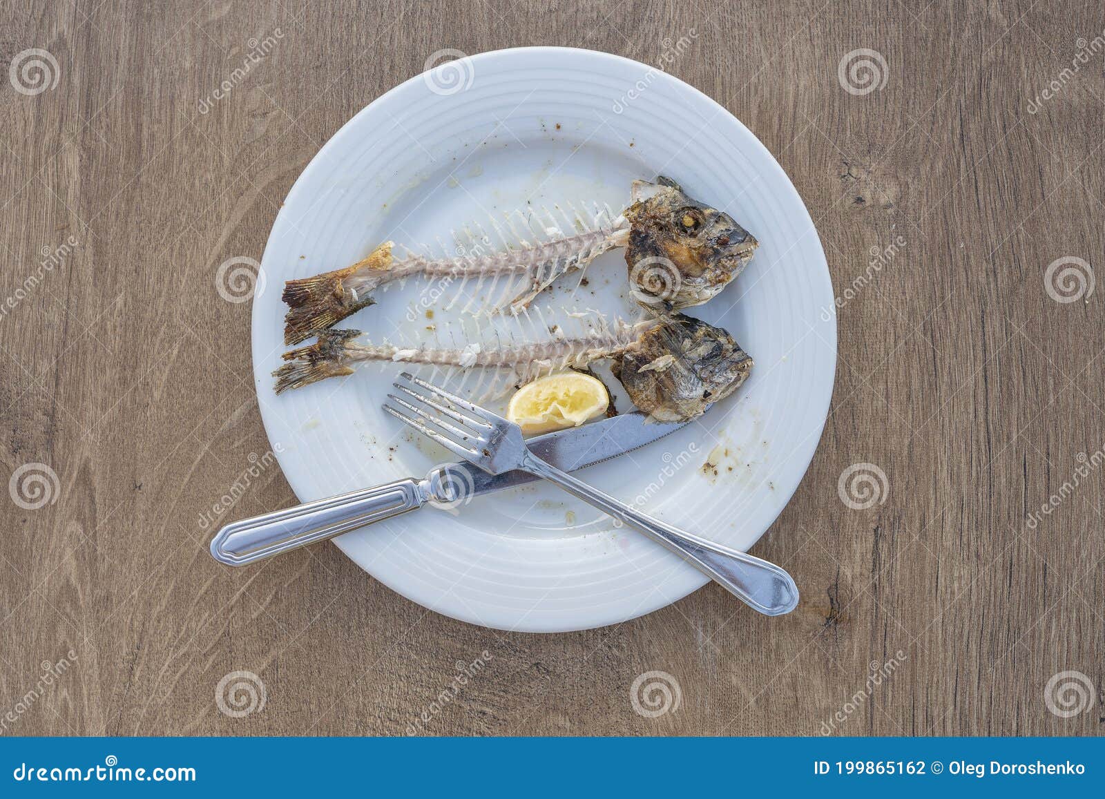 Fishbone With Fork And Knife In A Beautiful Plate Royalty-Free Stock ...