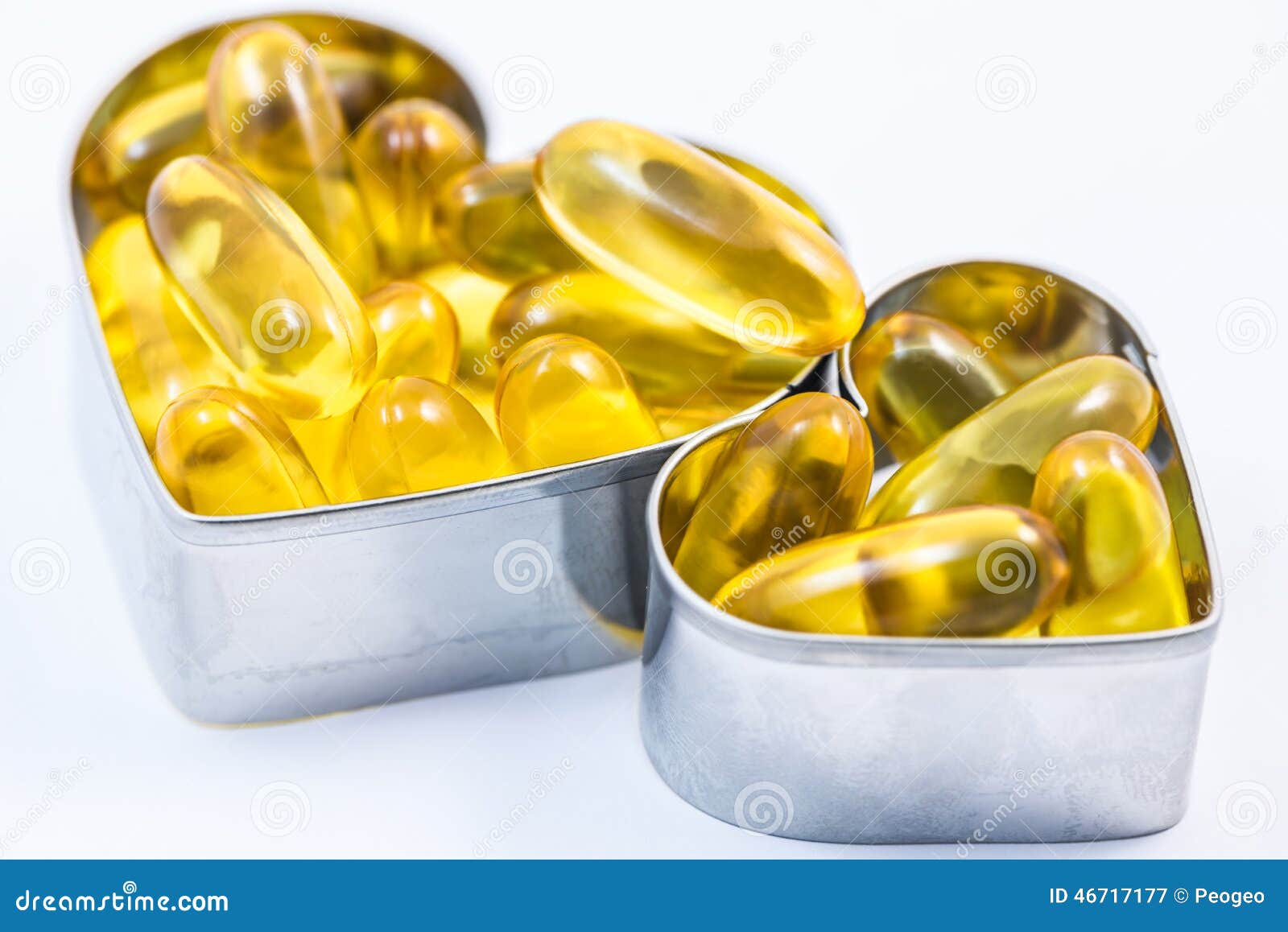 Two Fish Oil Pill Containers with Pills in Heart Shape Box Stock Image ...