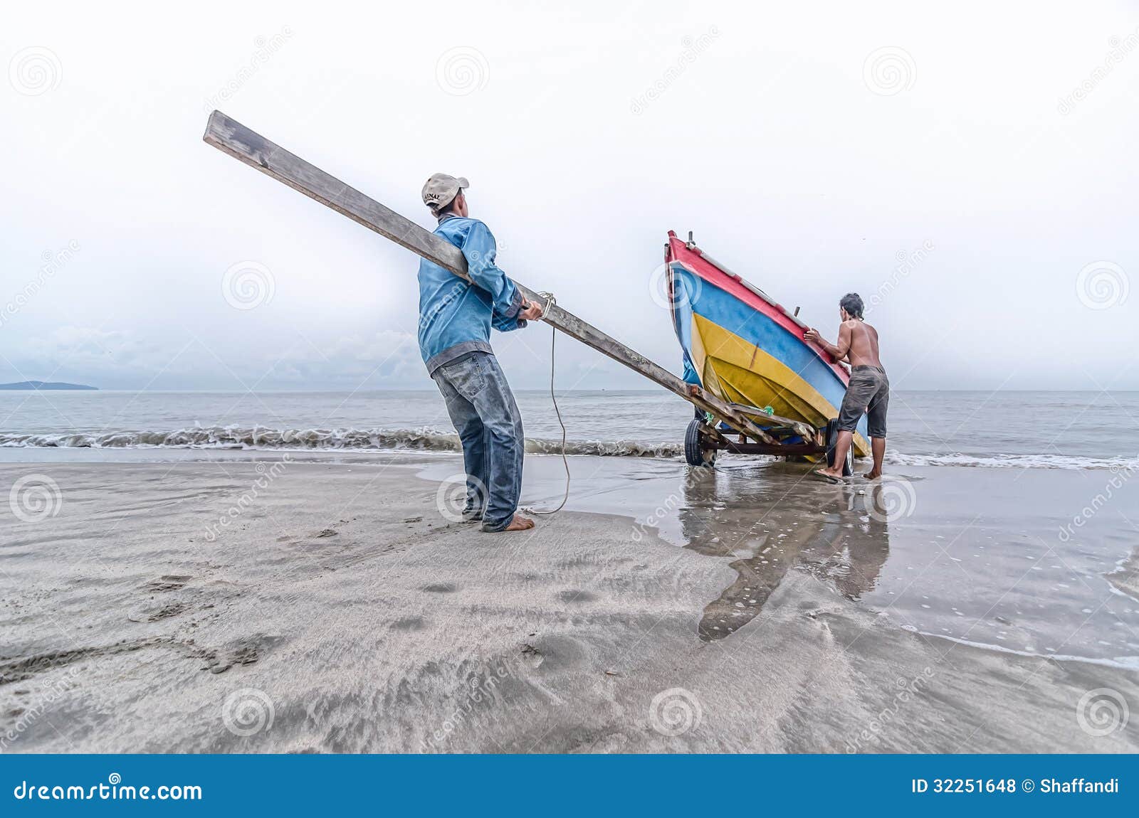 Two Fishermen Pull the Boat Stock Photo - Image of korea, sail: 32251648