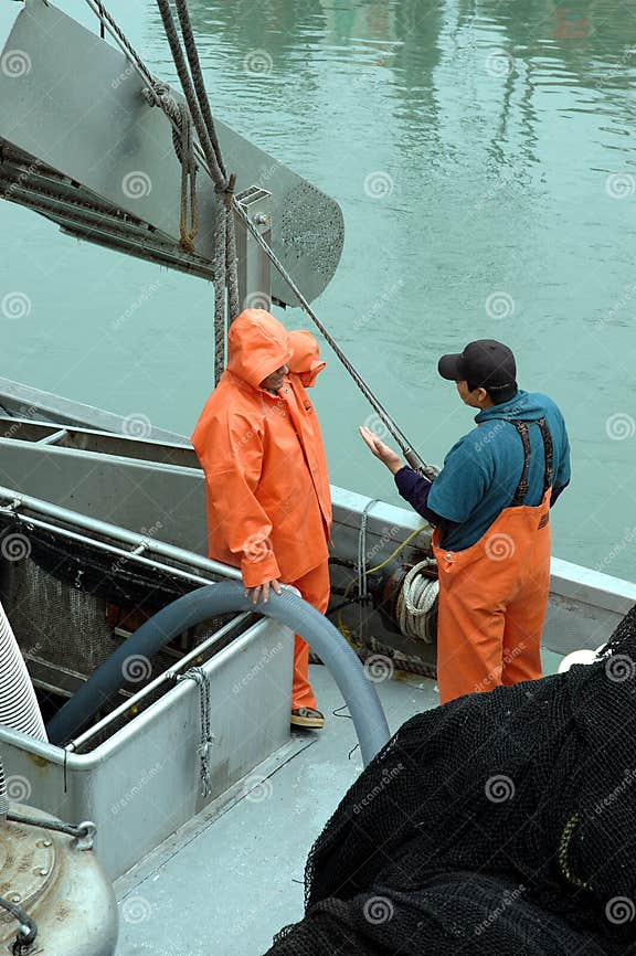 Two fishermen talking stock image. Image of working, marina - 79025
