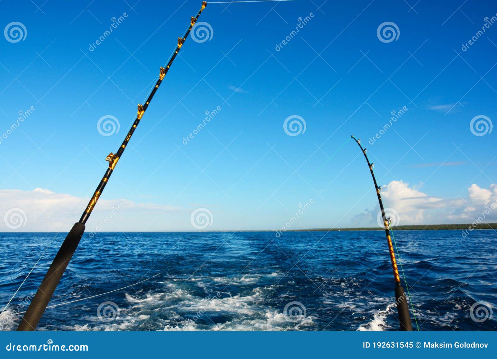 Two fishing rods on a boat stock image. Image of yacht - 192631545