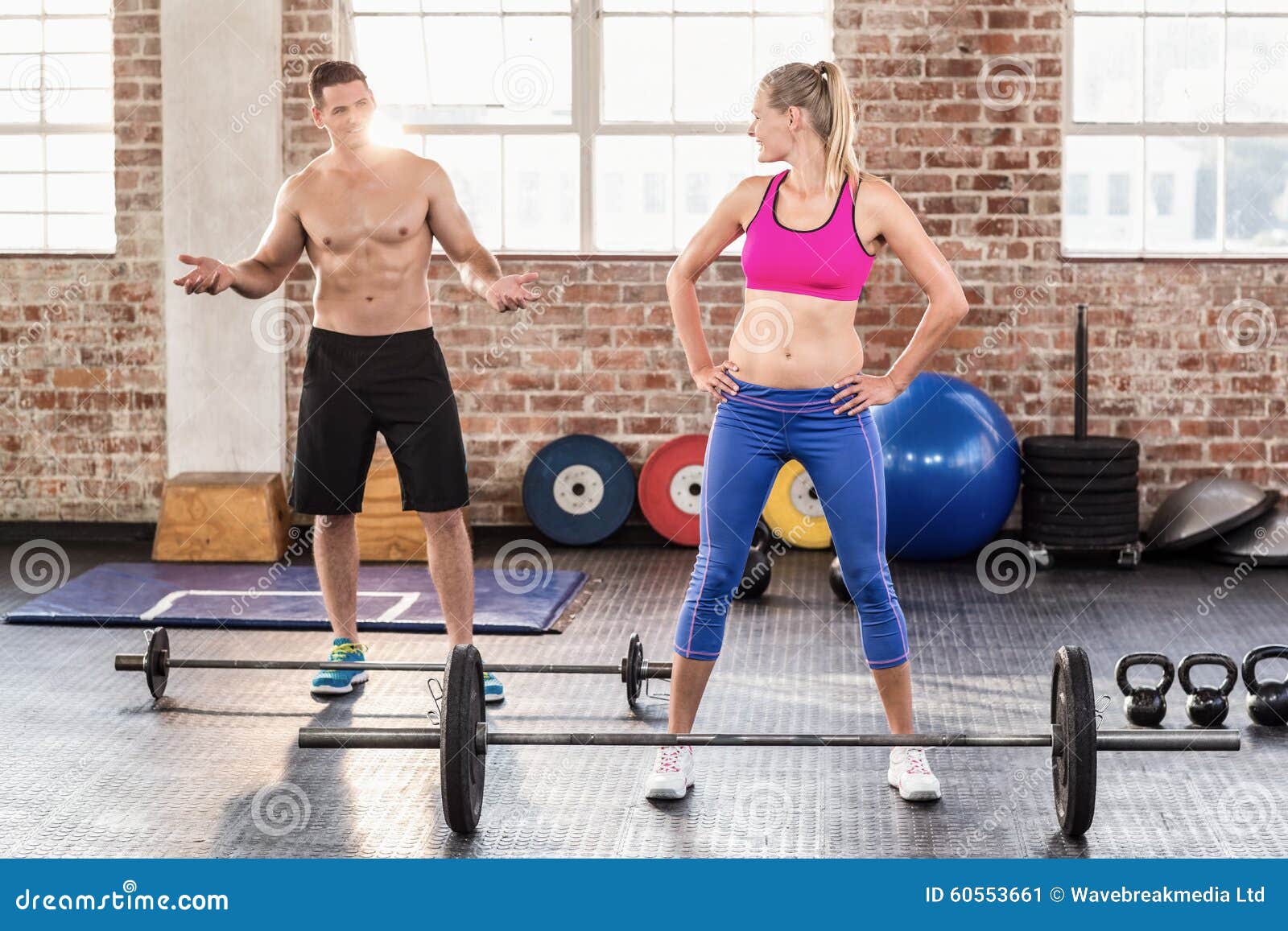 Two fit people working out stock image. Image of body - 60553661