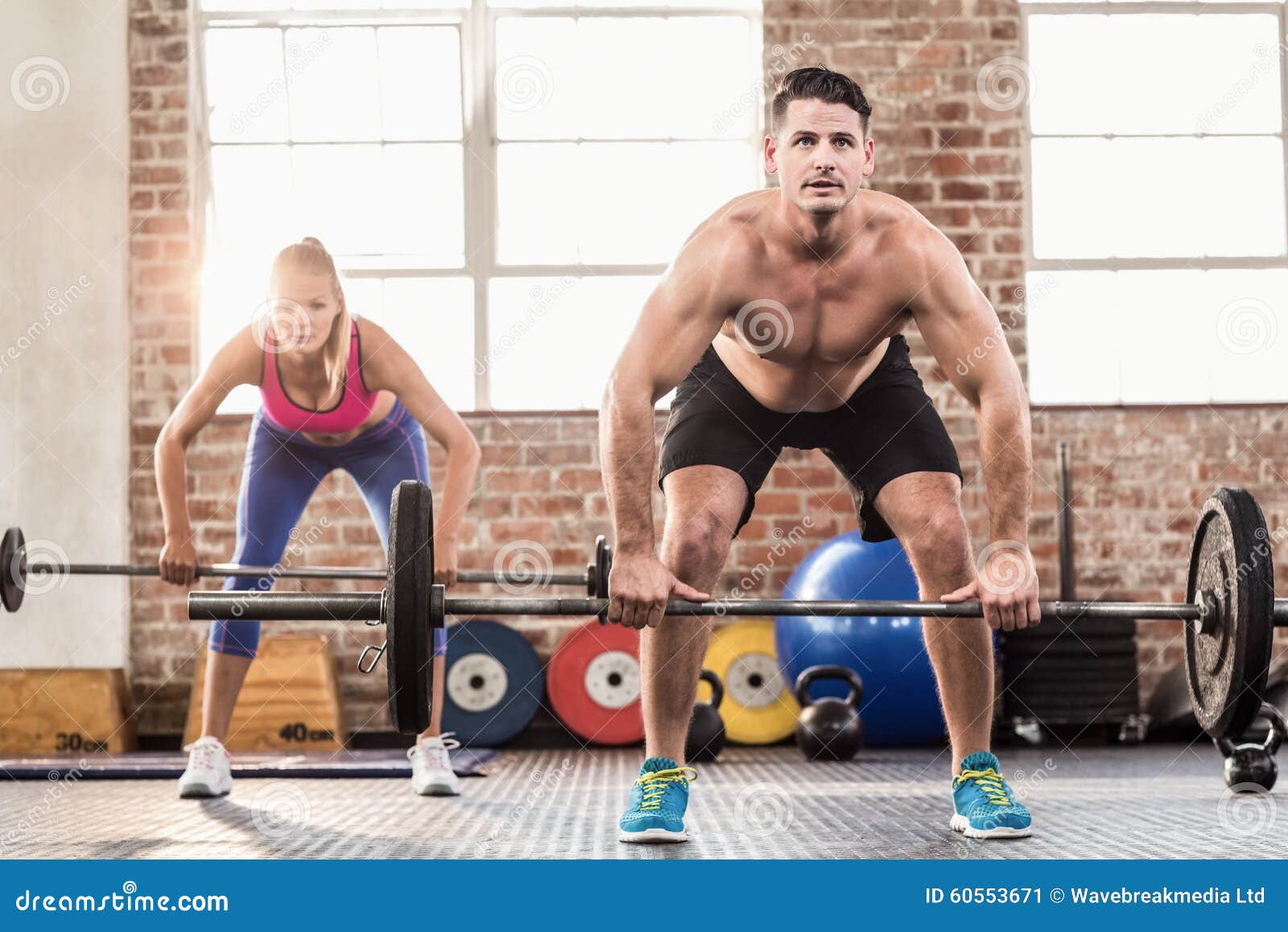 Two fit people working out stock image. Image of active - 60553671