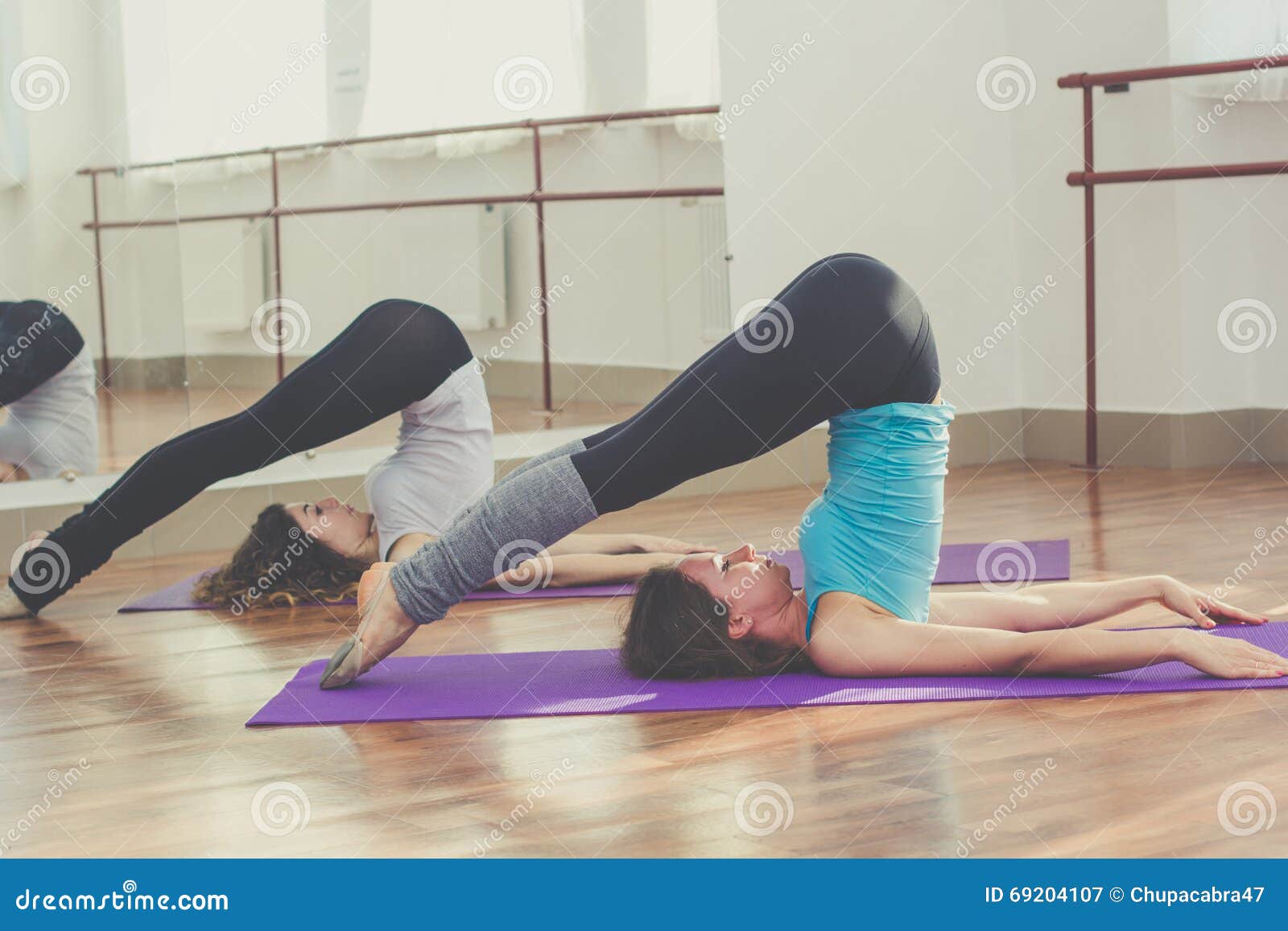 Two Fit Pretty Women are Stretching Back Together Stock Image - Image ...