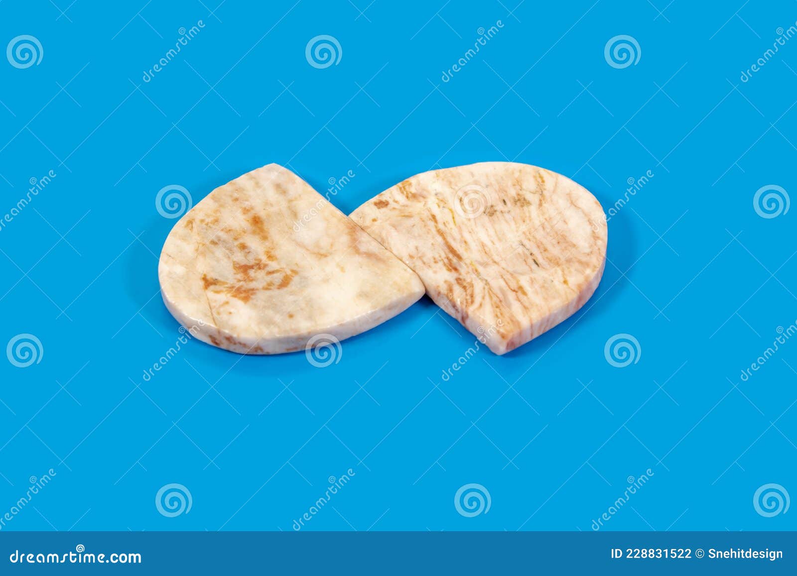 Two Flat Bead Stones on Blue Background Stock Photo - Image of stone ...