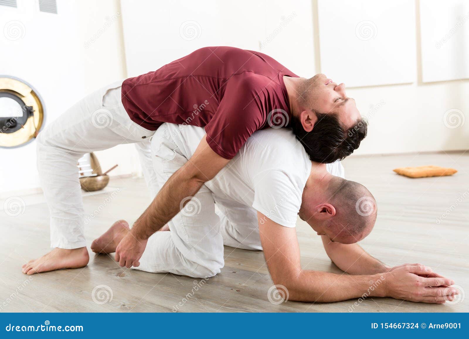 Two Men Performing Acroyoga Stock Photo - Image of partner, adult ...