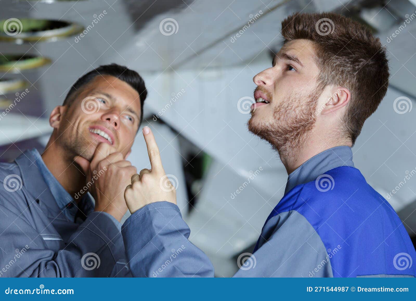 Two Flight Engineers Under Airplane Stock Image - Image of inside ...