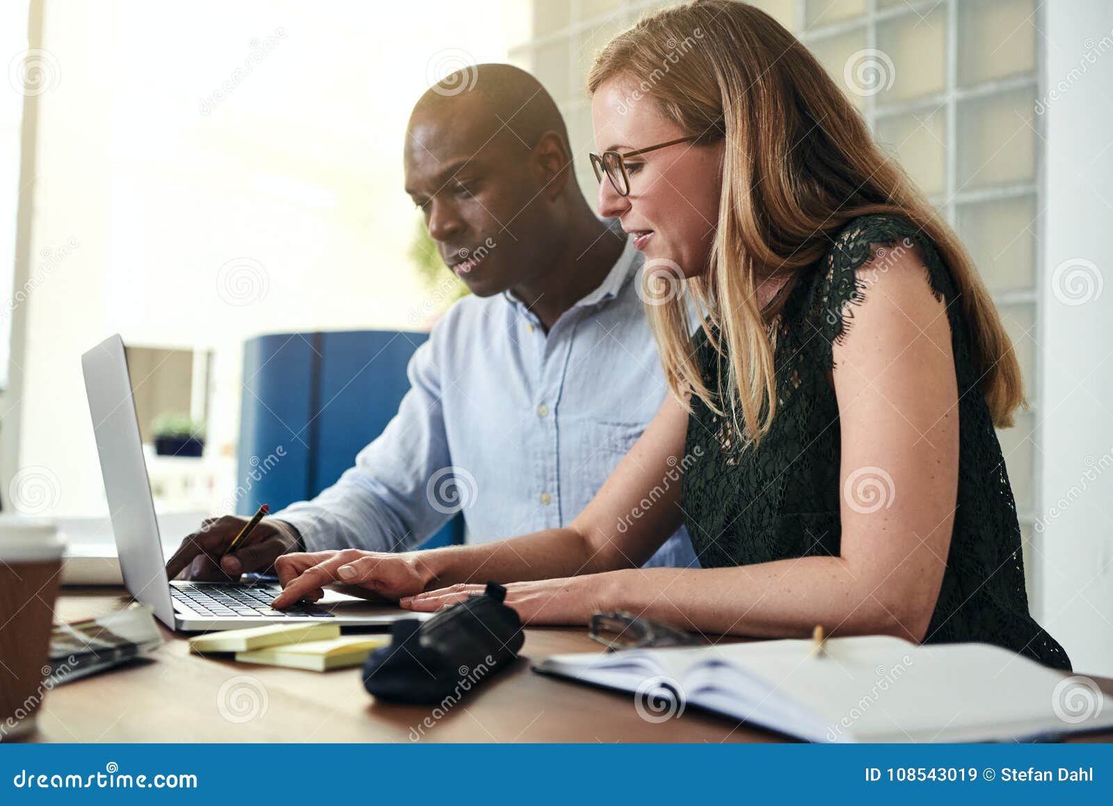 Colleagues Working Online with a Laptop at an Office Table Stock Image ... Colleagues Working Online with a Laptop at an Office Table Stock Image ...