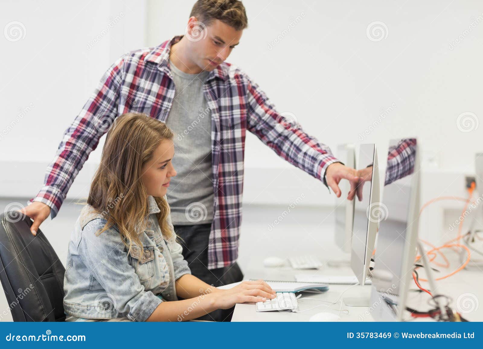 Two Focused Students Working on Computer Stock Image - Image of ...