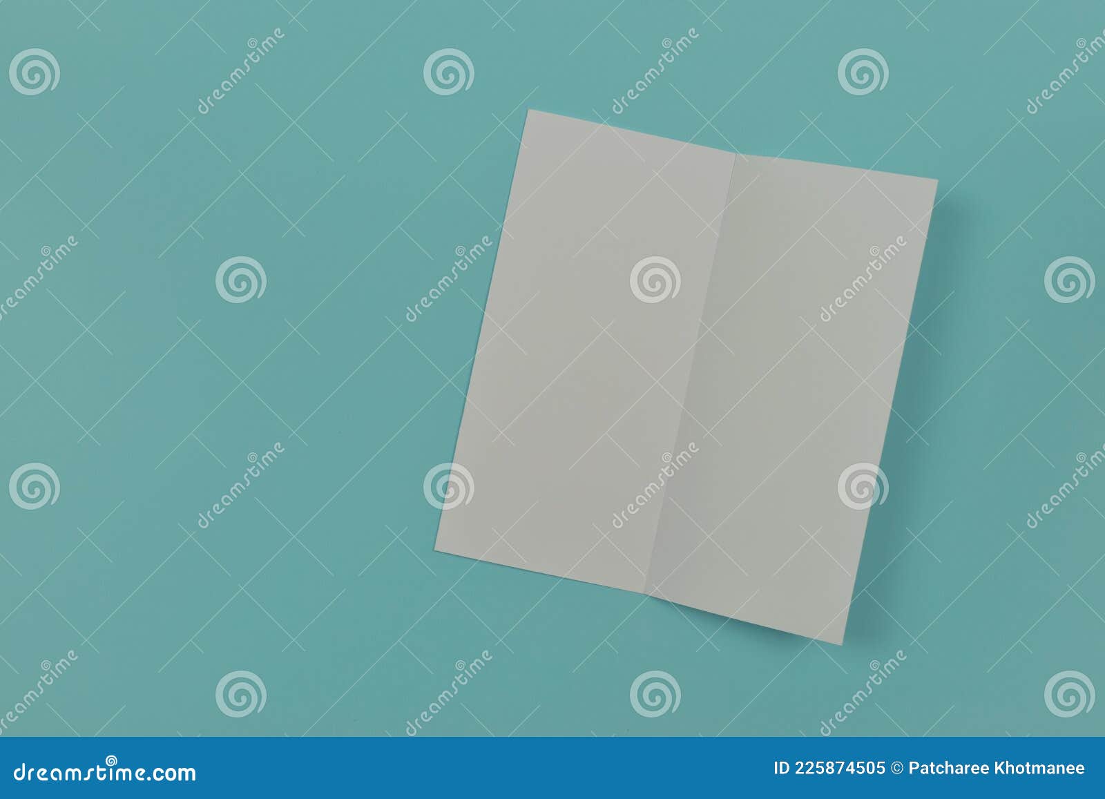 Two Folded Blank Paper Leaflet on Blue Background Stock Image - Image ...