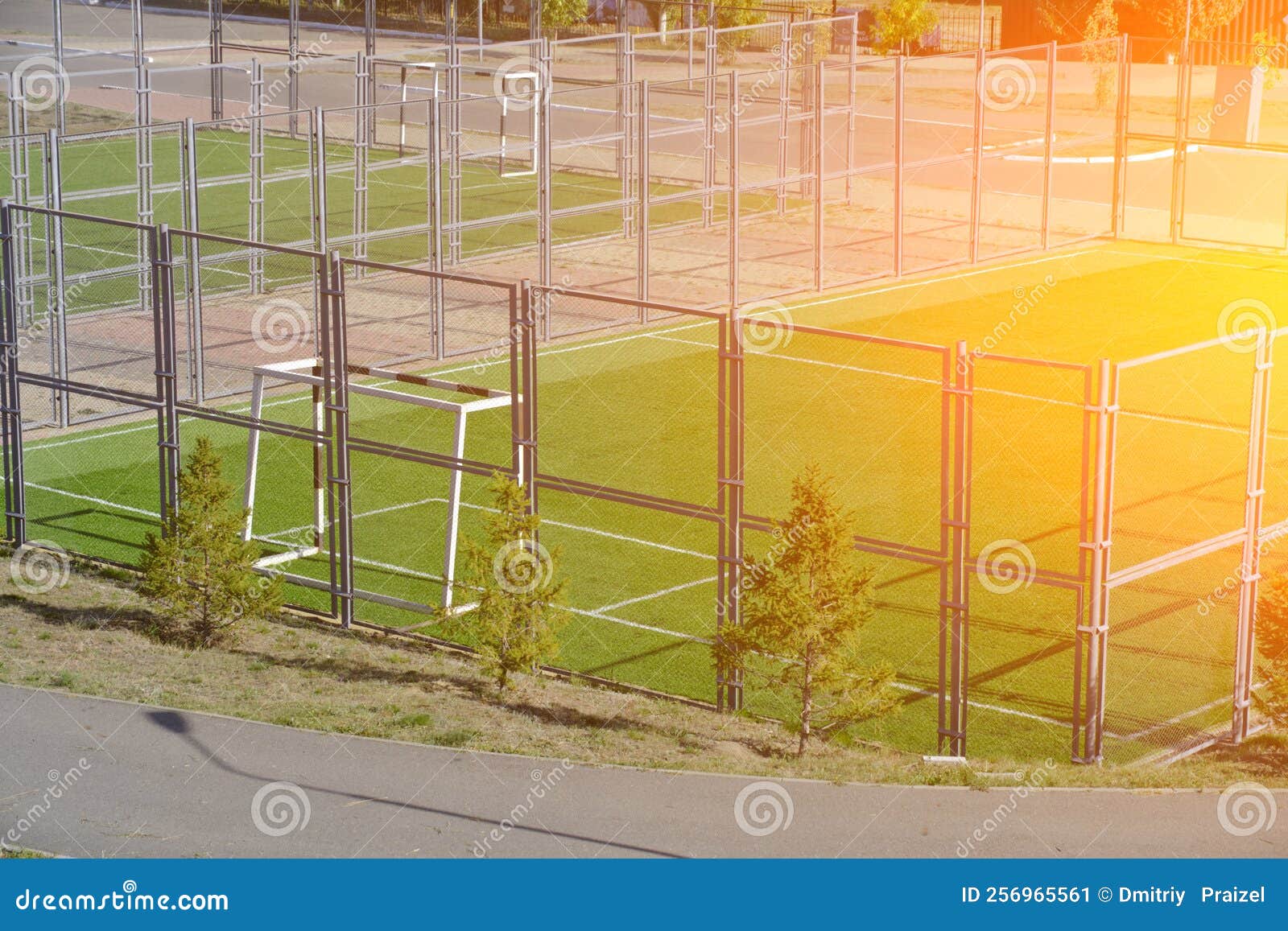 Two Football Fields with Freshly Laid Artificial Turf in the Sunlight ...