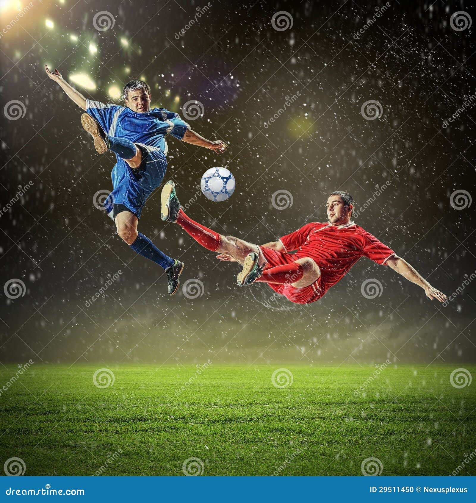 Two Football Players Striking the Ball Stock Photo - Image of goal ...