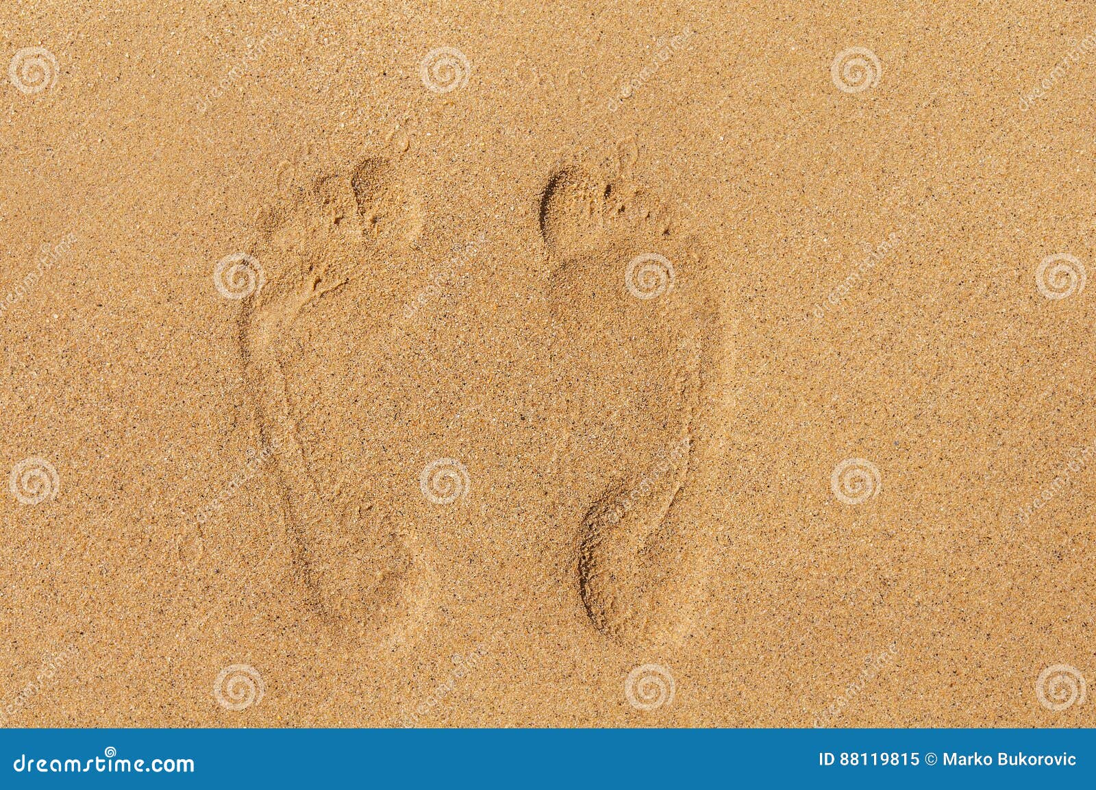Two Footprints in Sand on Beach Stock Image - Image of leisure, print ...