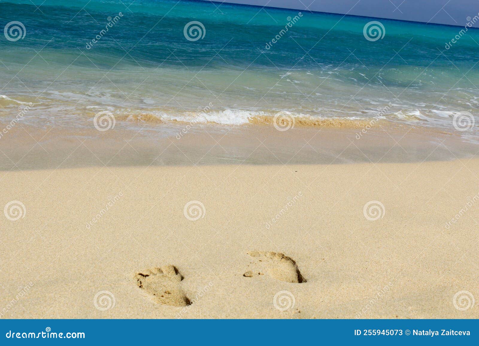 Two Footprints on Yellow Sand Stock Image - Image of sand, foot: 255945073