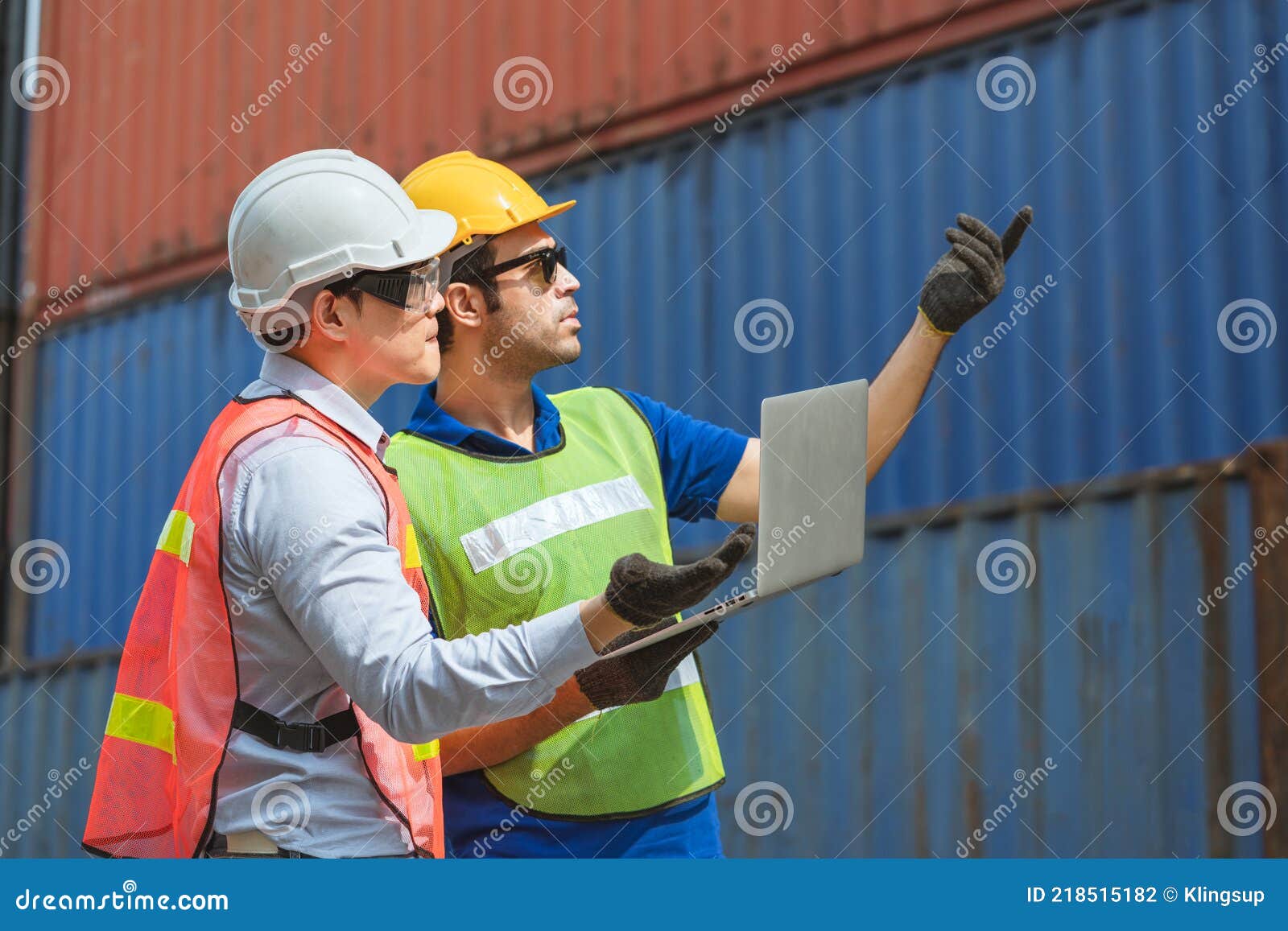 Two Foreman with Laptop Checking Position Loading Containers Box from ...