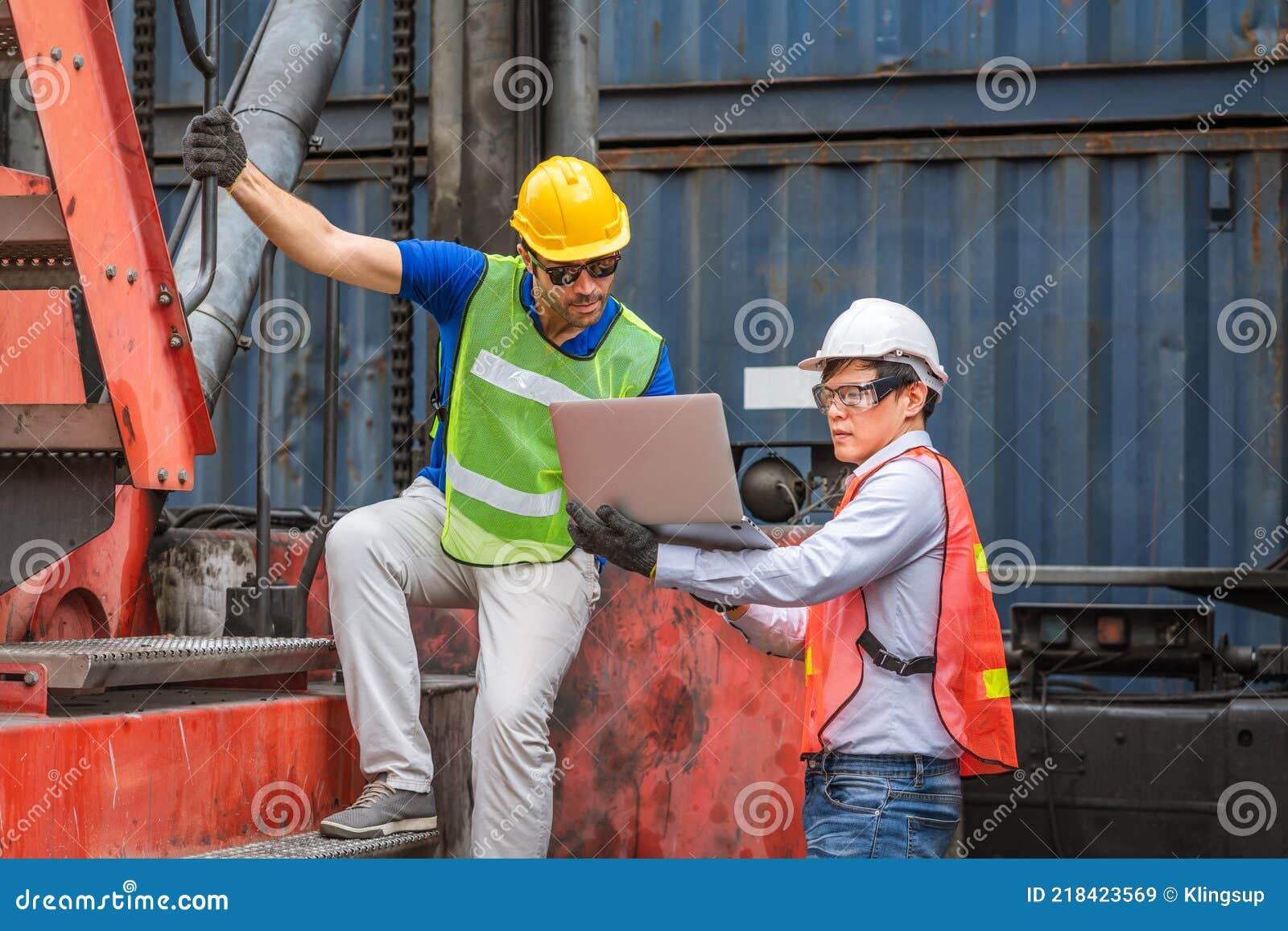 Foreman with Laptop Checking Position Loading Containers Box from Cargo ...